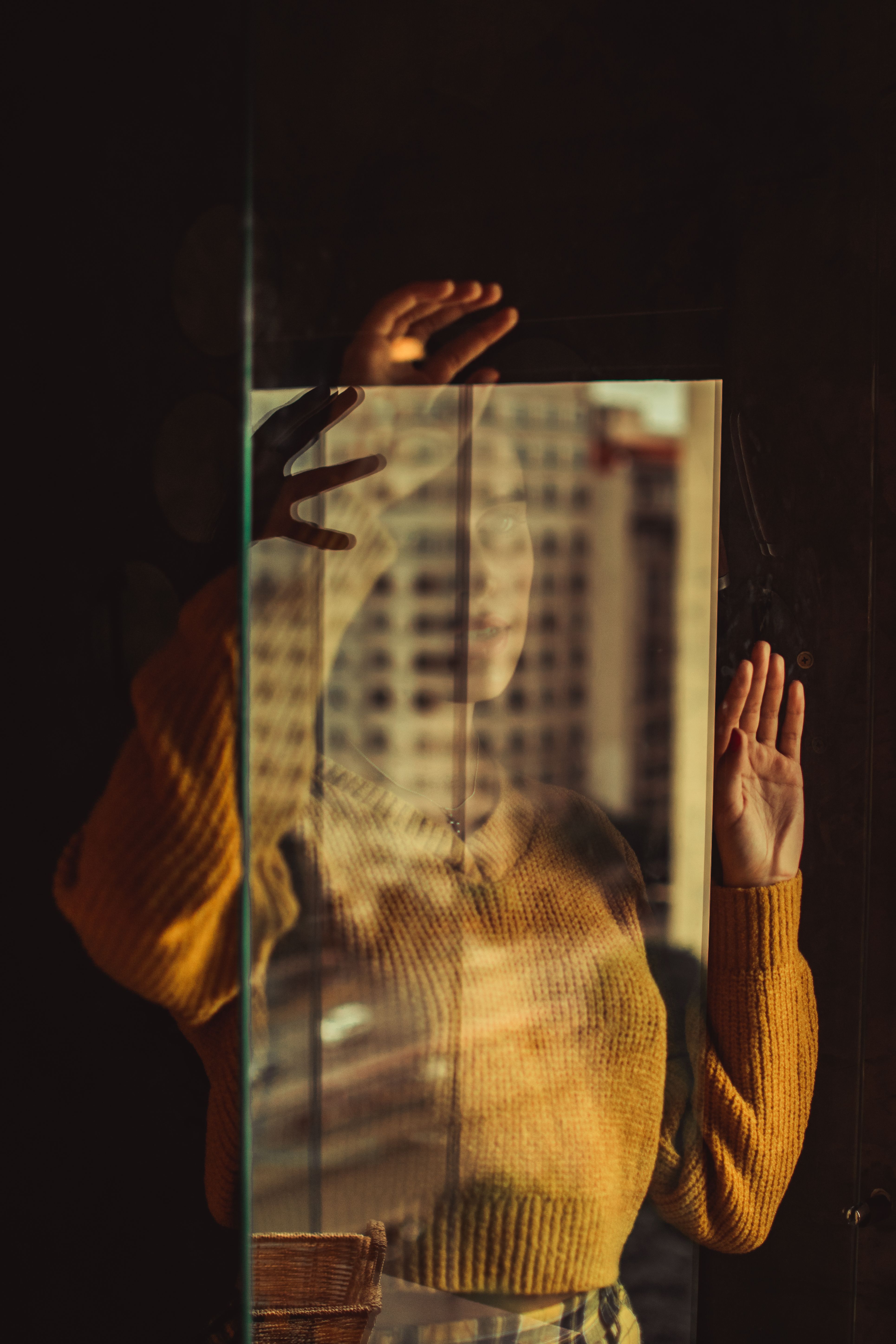 Woman Holding On Glass · Free Stock Photo