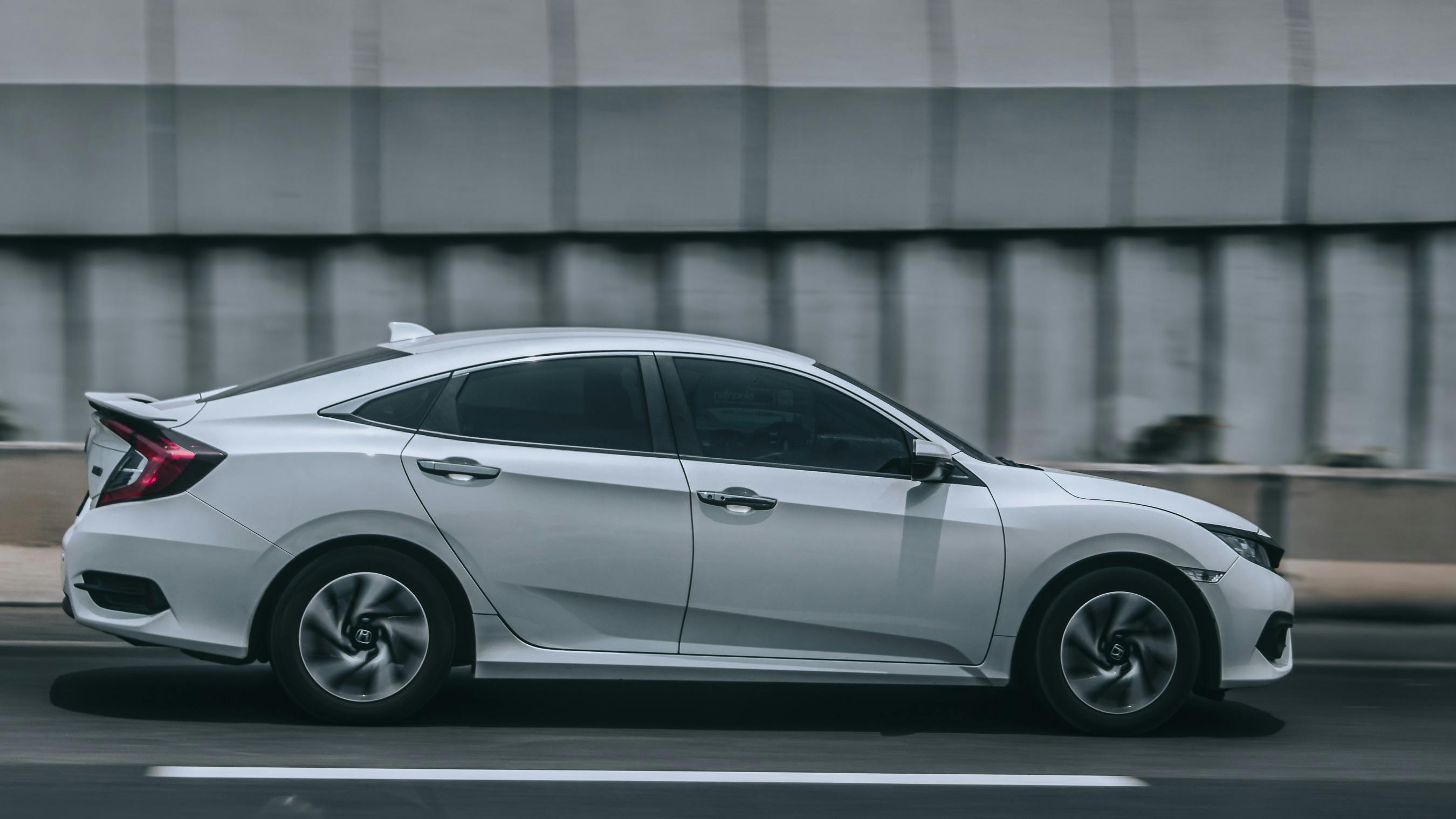 White Car on a Road · Free Stock Photo