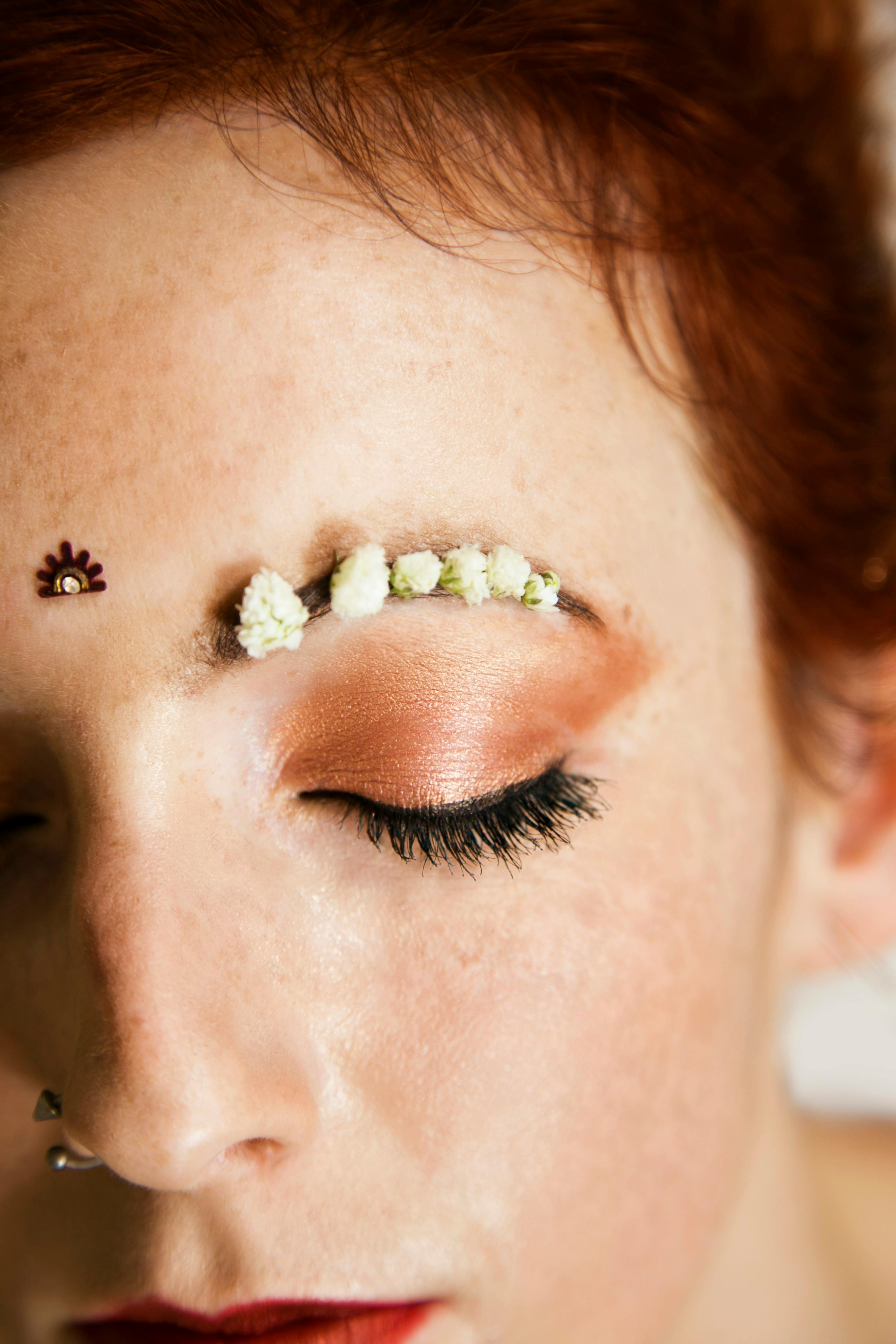 Flowers on Woman Eyebrow · Free Stock Photo