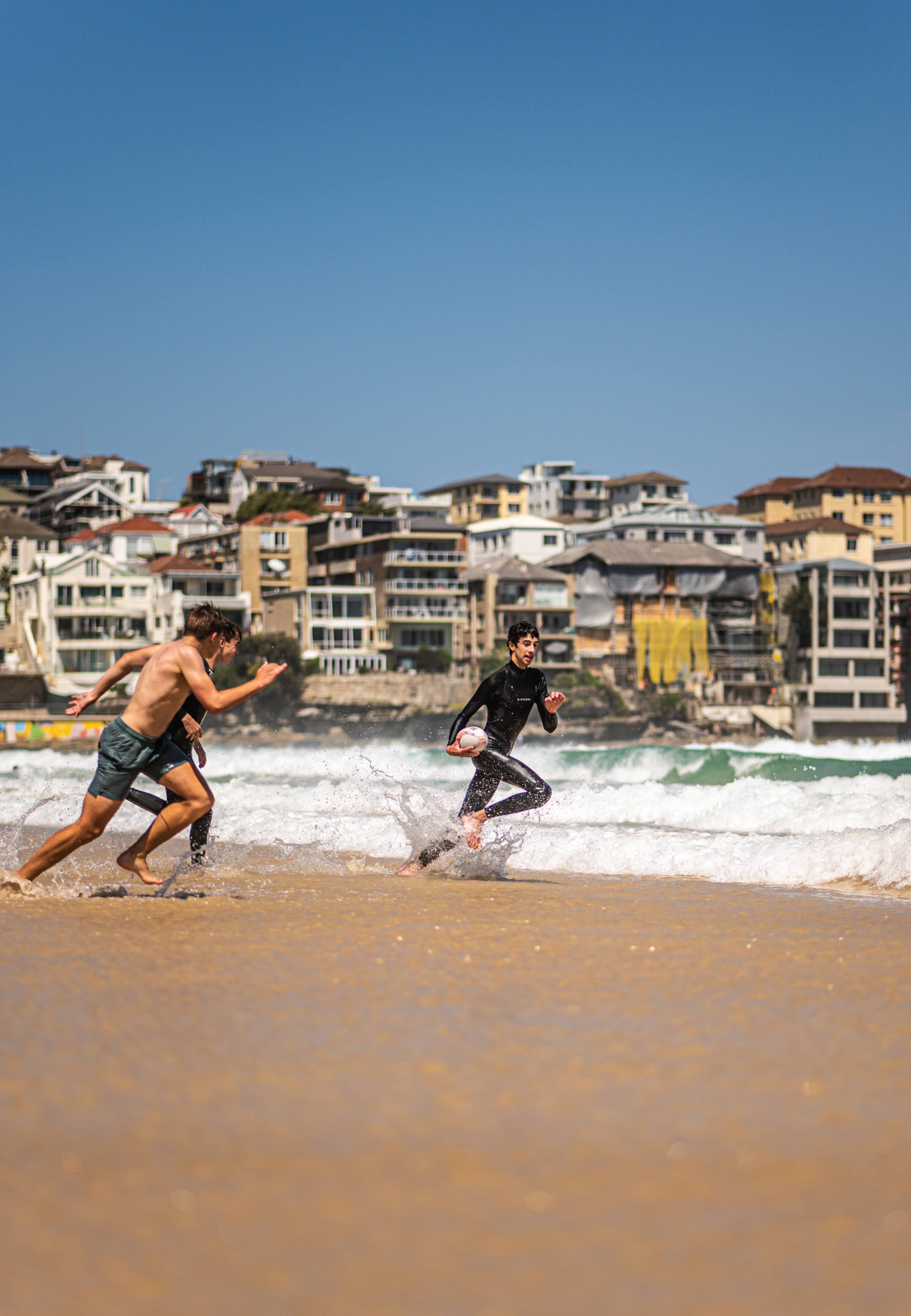 Men Running on Bondi Beach in Sydney, Australia · Free Stock Photo