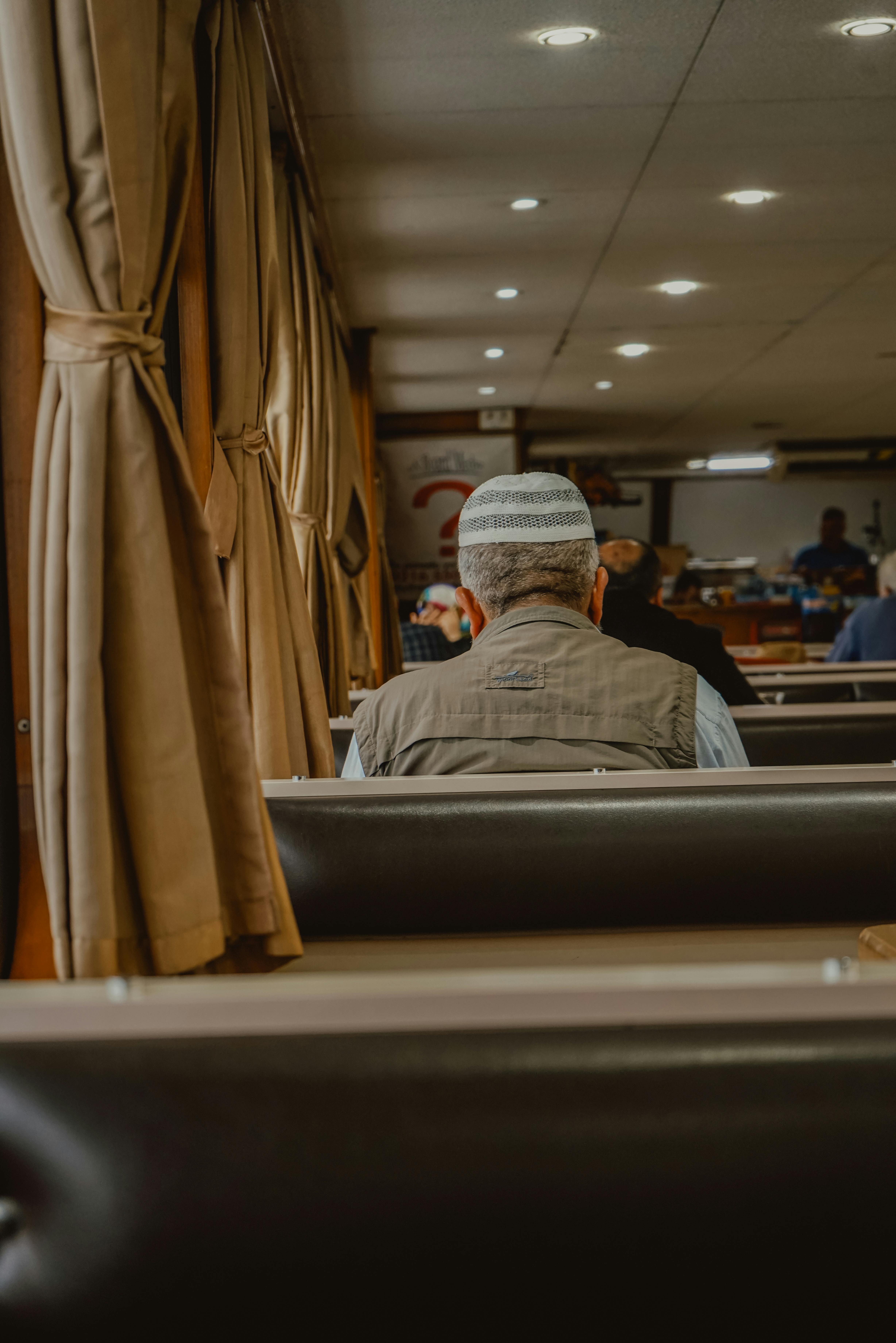 Back View of Elderly Man Sitting · Free Stock Photo