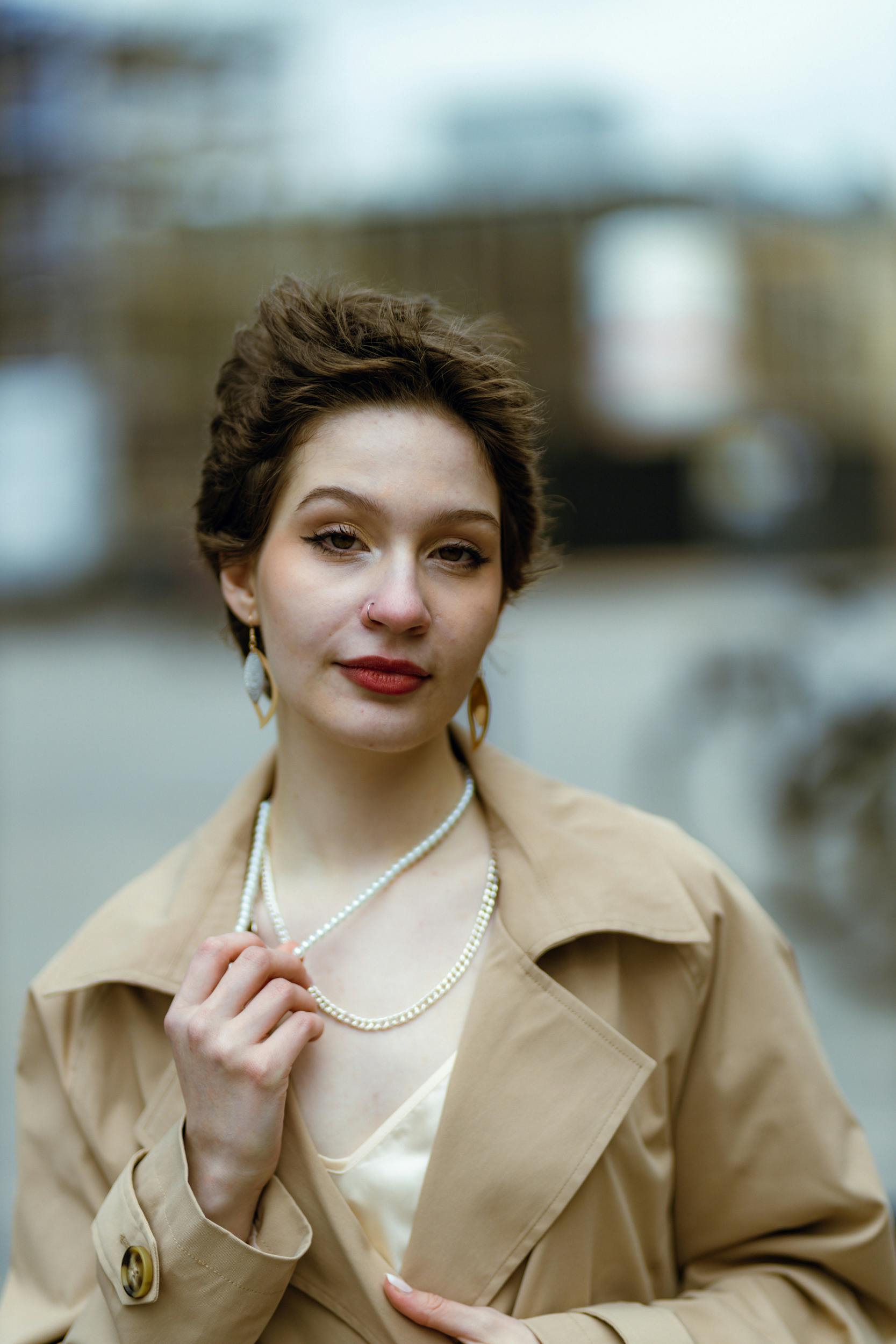 Model Wearing Pearls to Trench Coat · Free Stock Photo