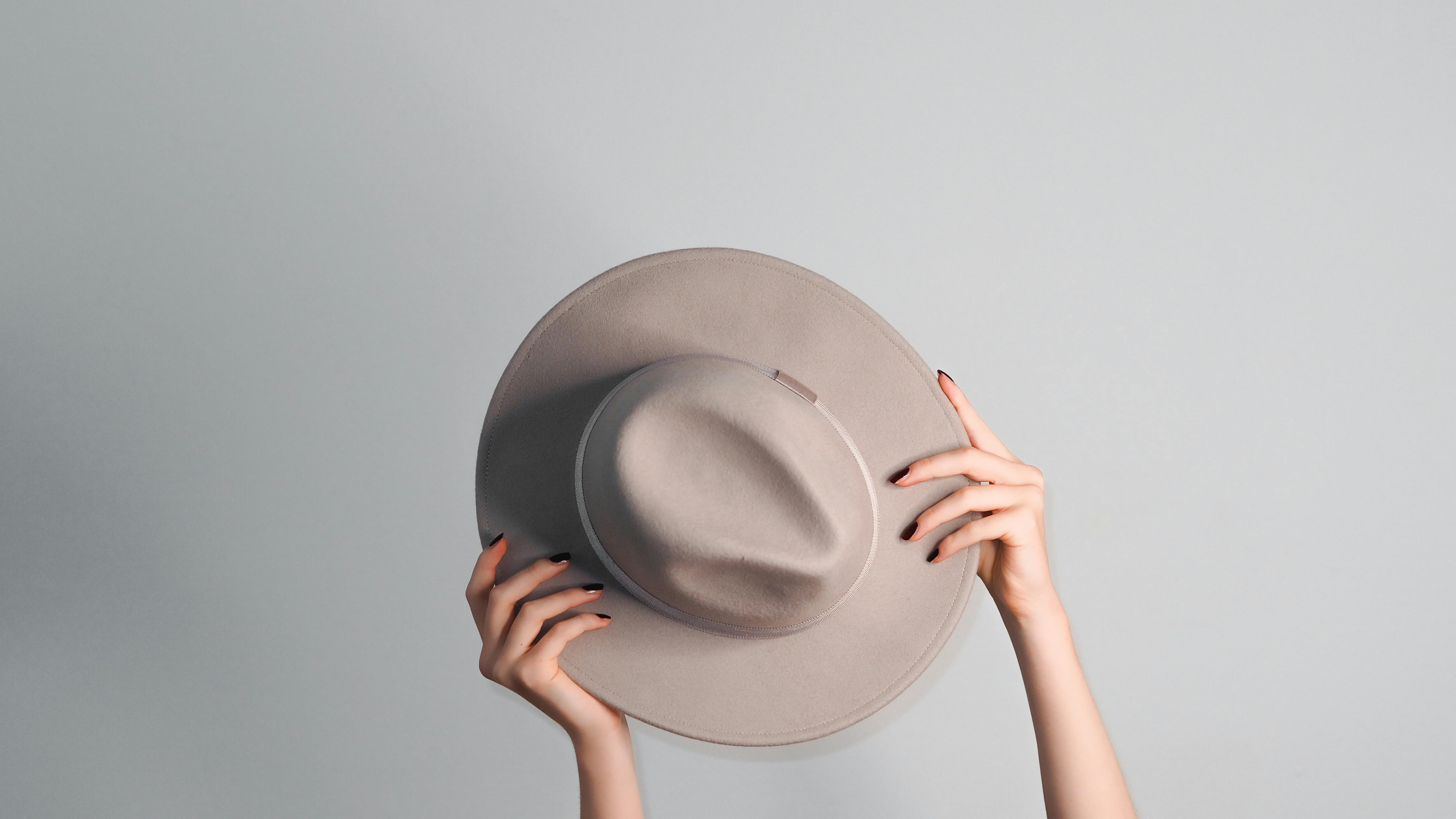 Woman Hands Holding Hat · Free Stock Photo