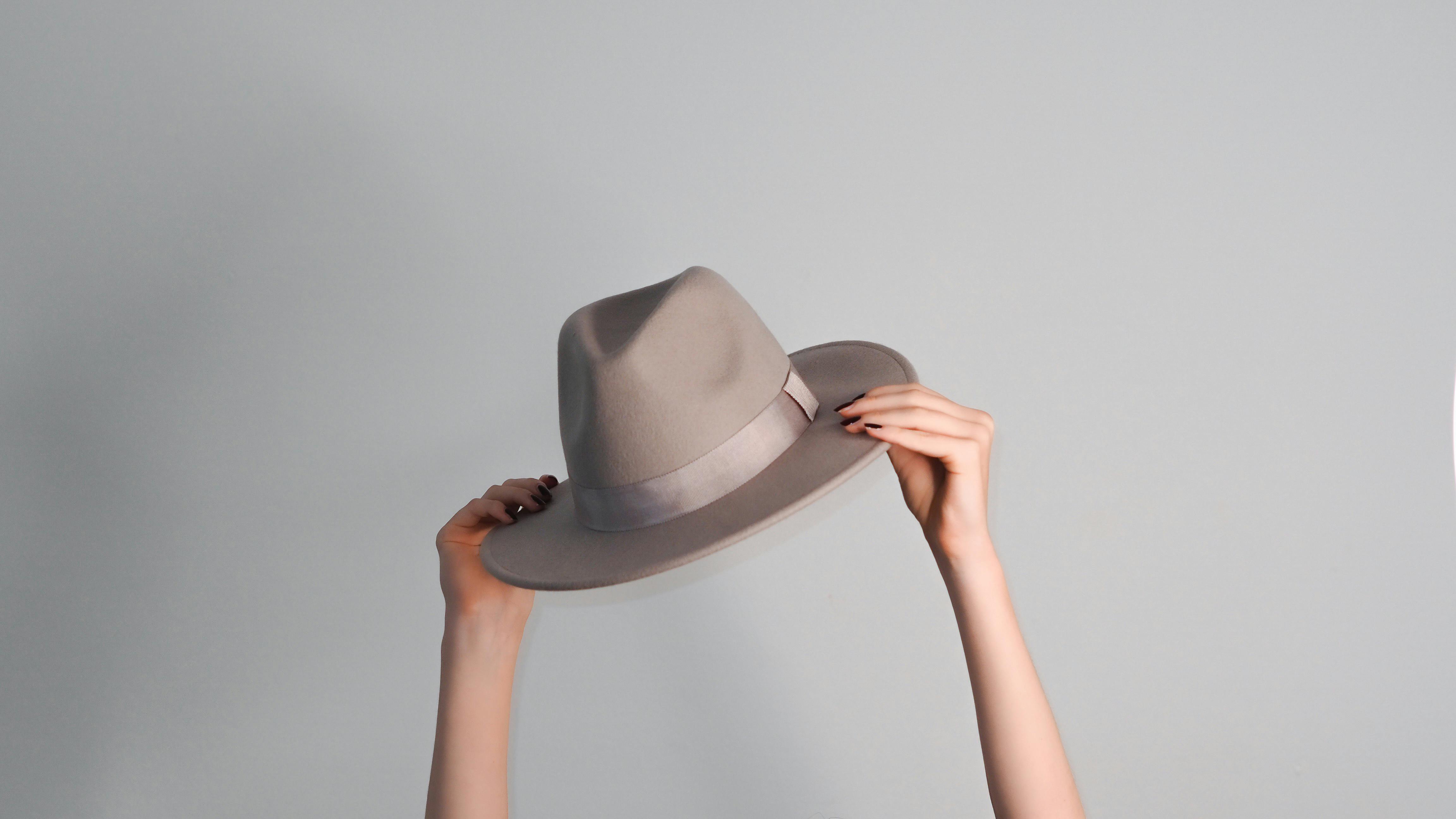 Woman Hands Holding Hat · Free Stock Photo