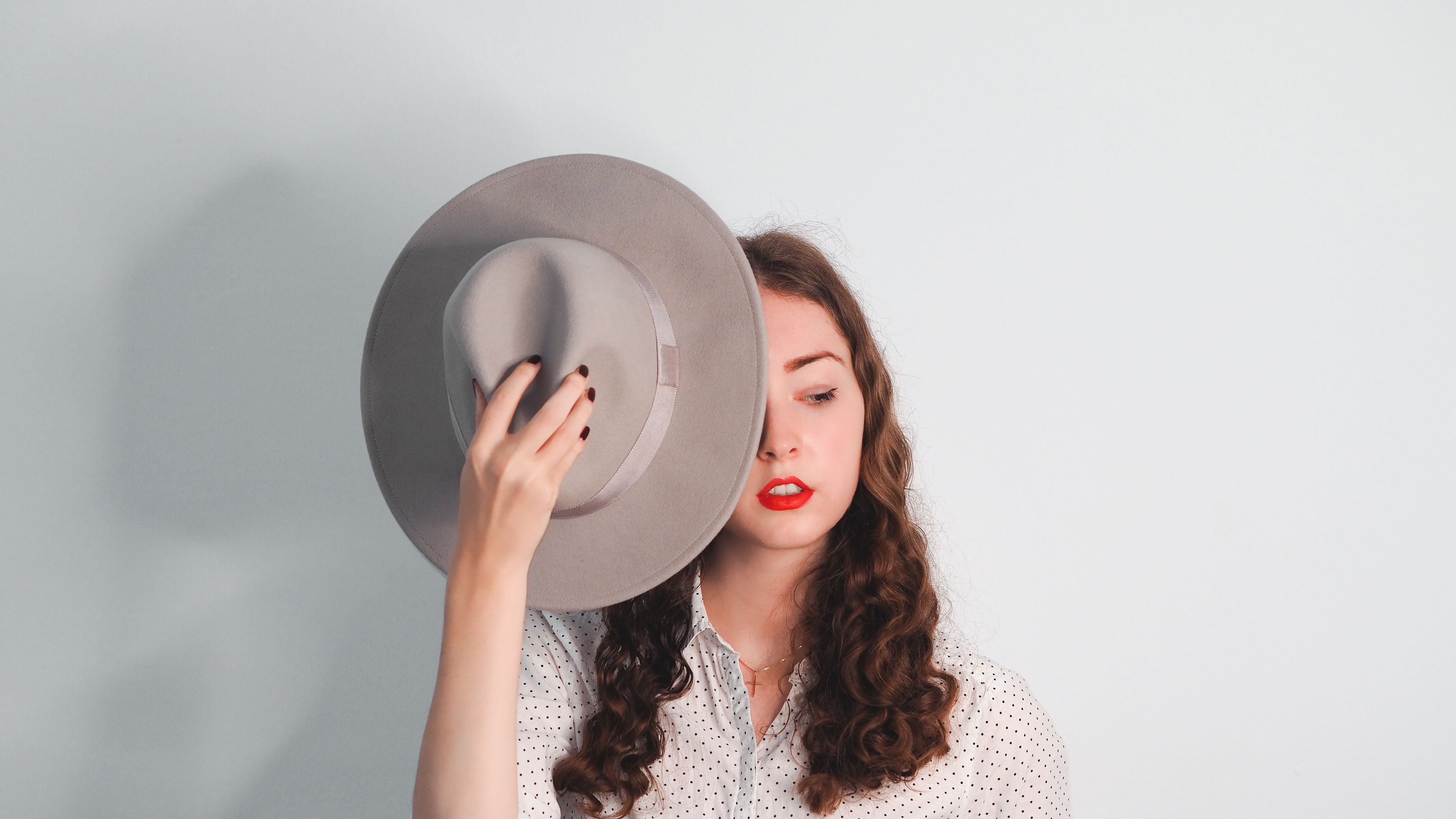 Model Posing with Hat · Free Stock Photo