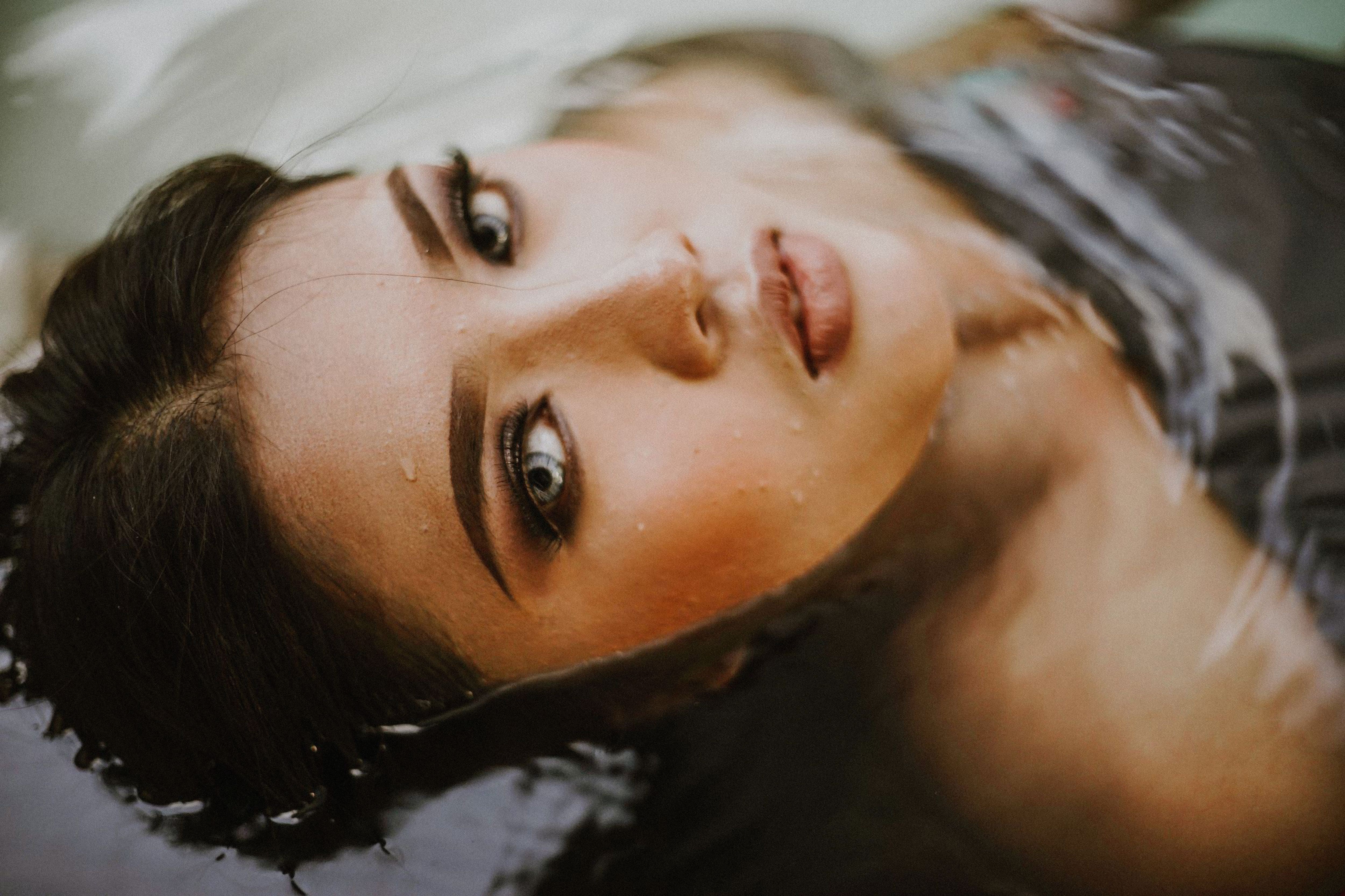 Woman Floating In the Water · Free Stock Photo