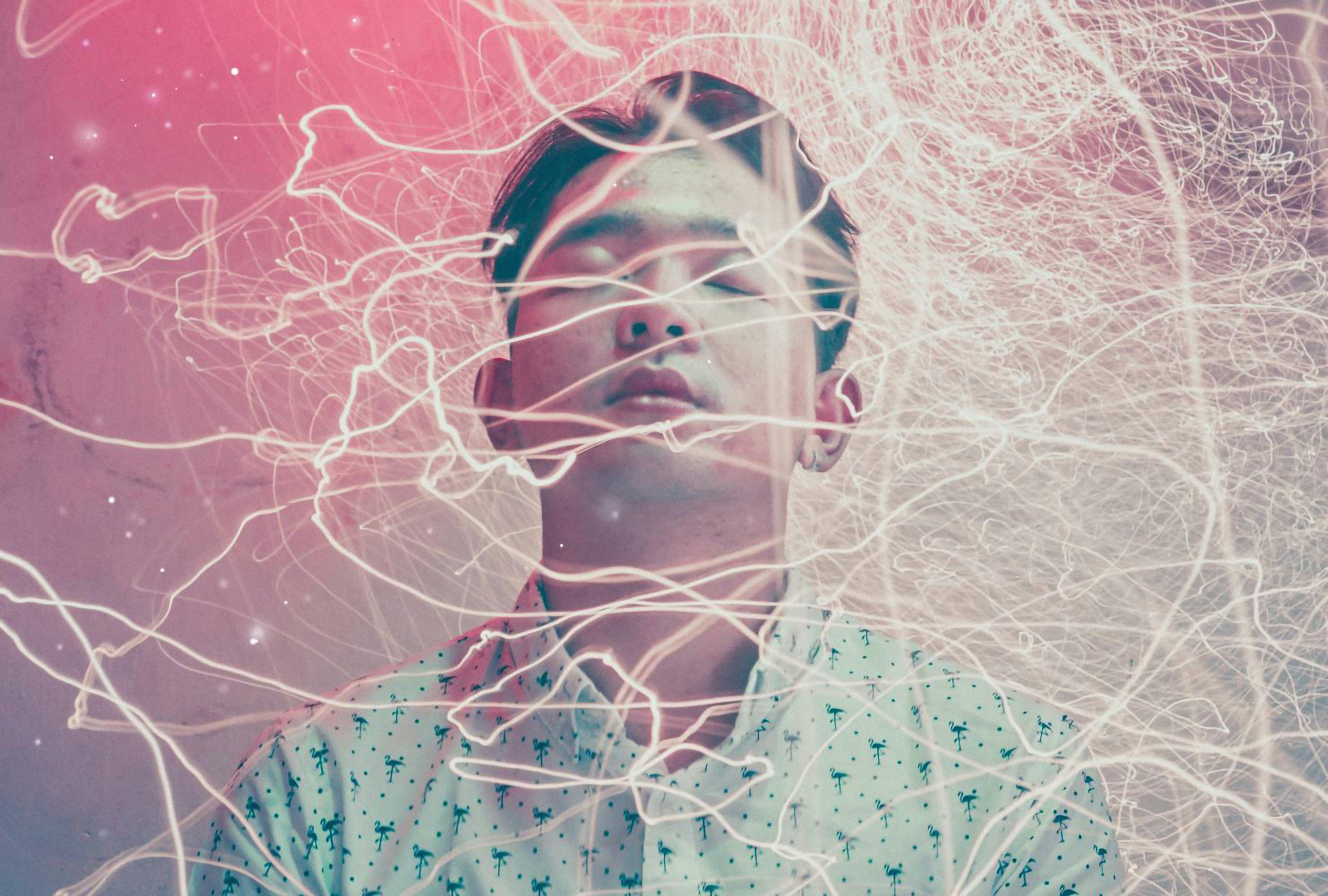 Portrait of a Young Man Surrounded by Light Trails · Free Stock Photo