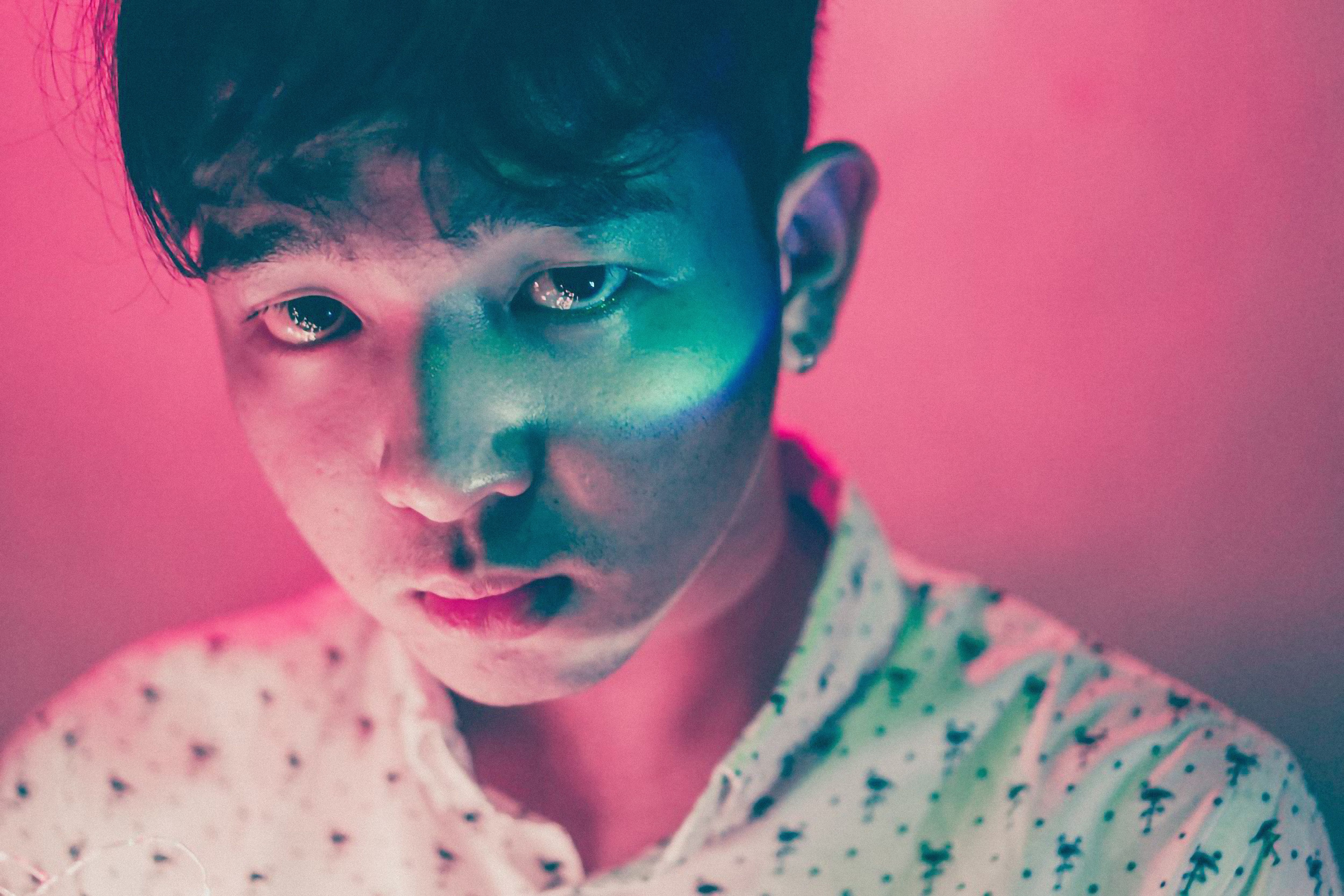 Face of Man on Pink Background · Free Stock Photo