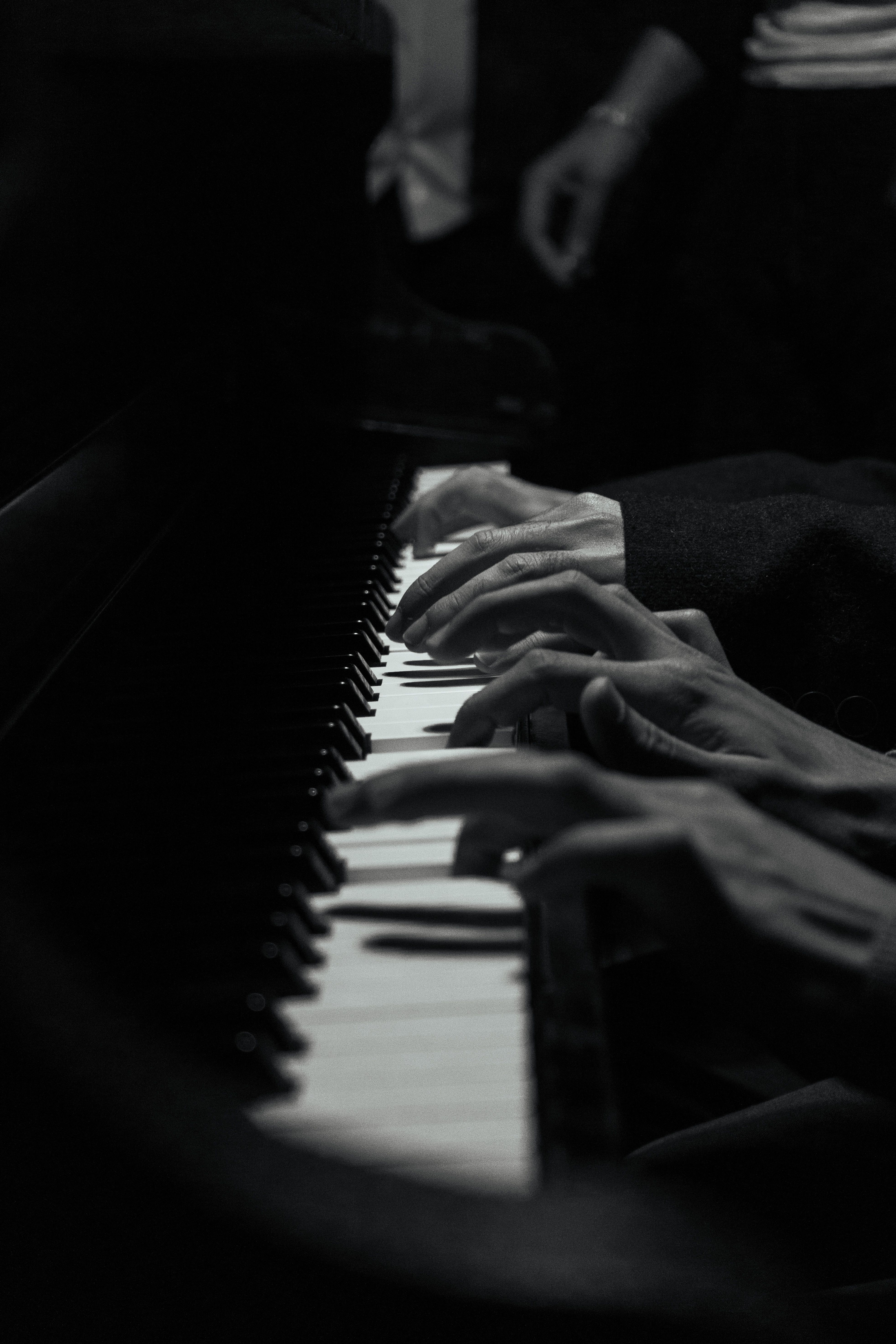 Hands of People Playing Piano · Free Stock Photo