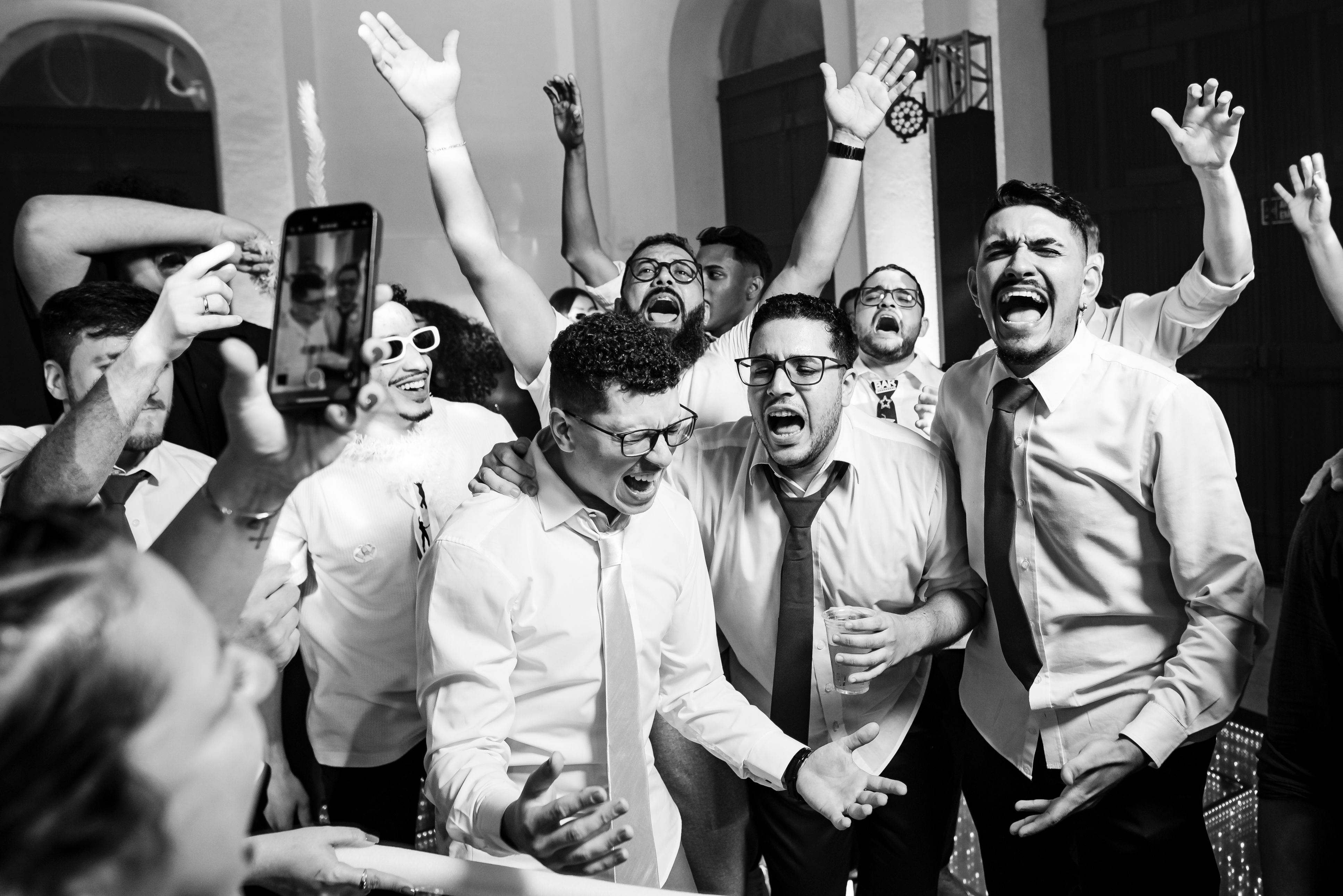 A group of men celebrating at a wedding · Free Stock Photo