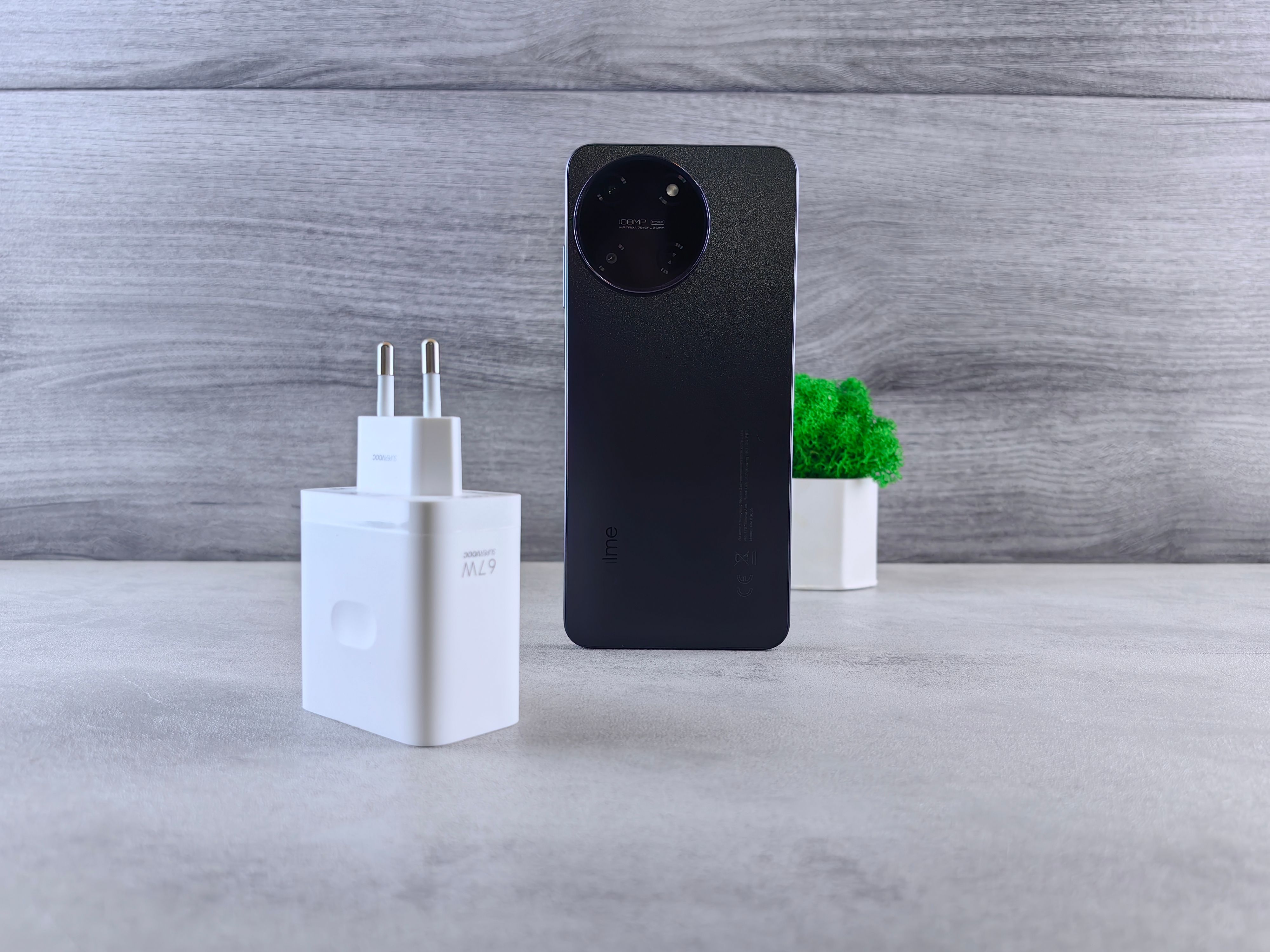 Smartphone, Charger and Plant · Free Stock Photo