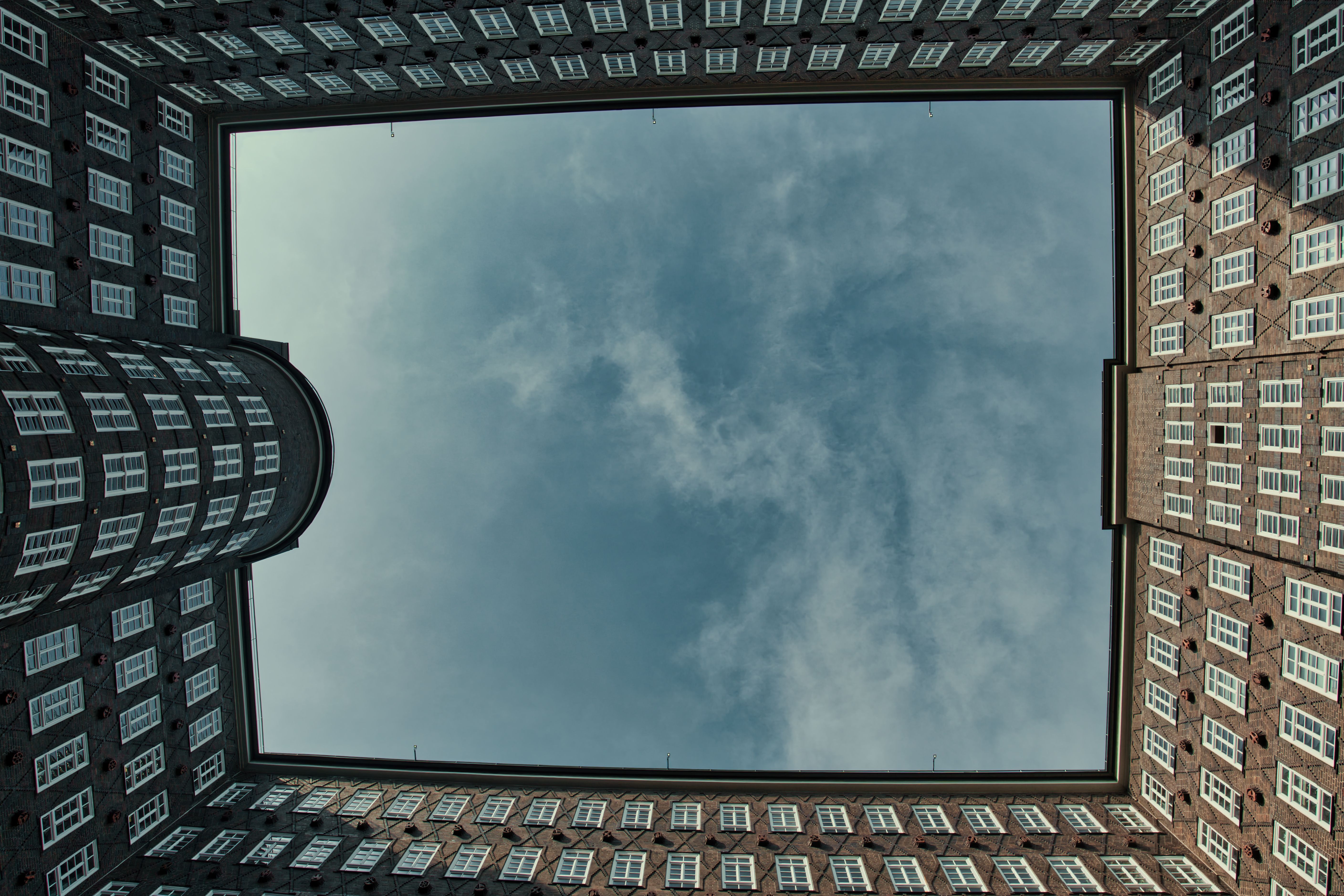 Low Angle Shot of the Sprinkenhof Building Courtyard · Free Stock Photo