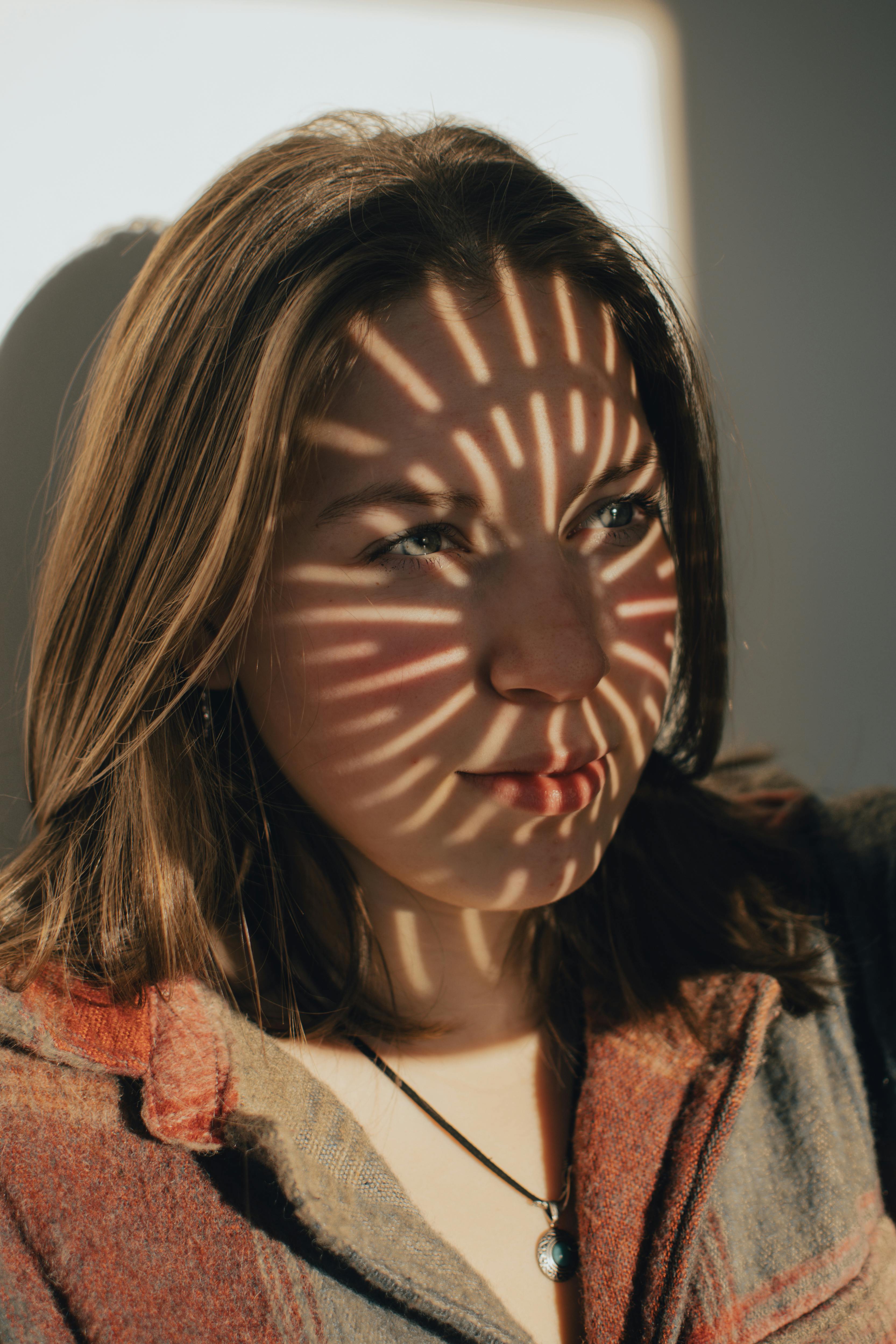 Face in Shadow and Sunlight · Free Stock Photo