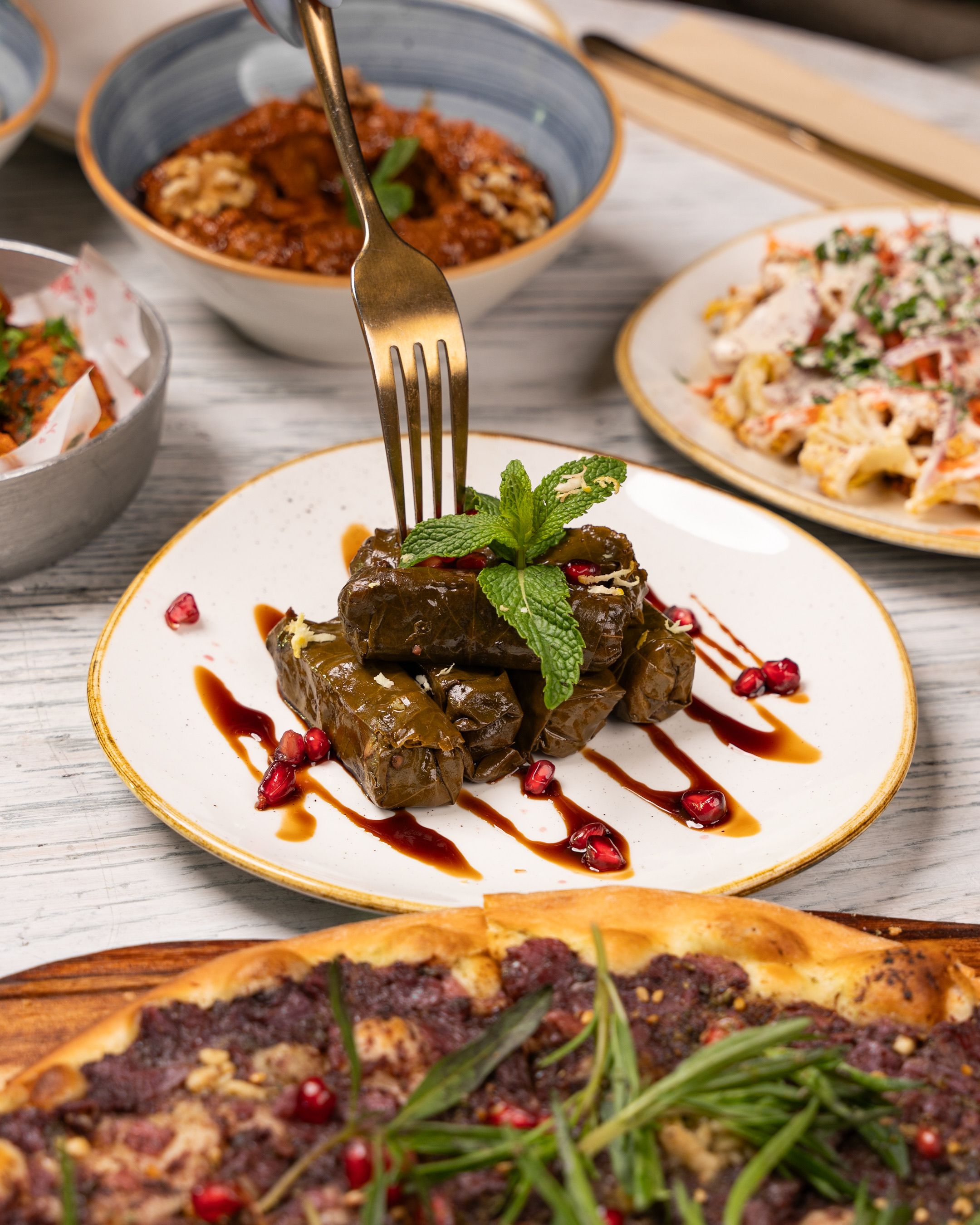 Close-up of a Table Full of Delicious Food · Free Stock Photo