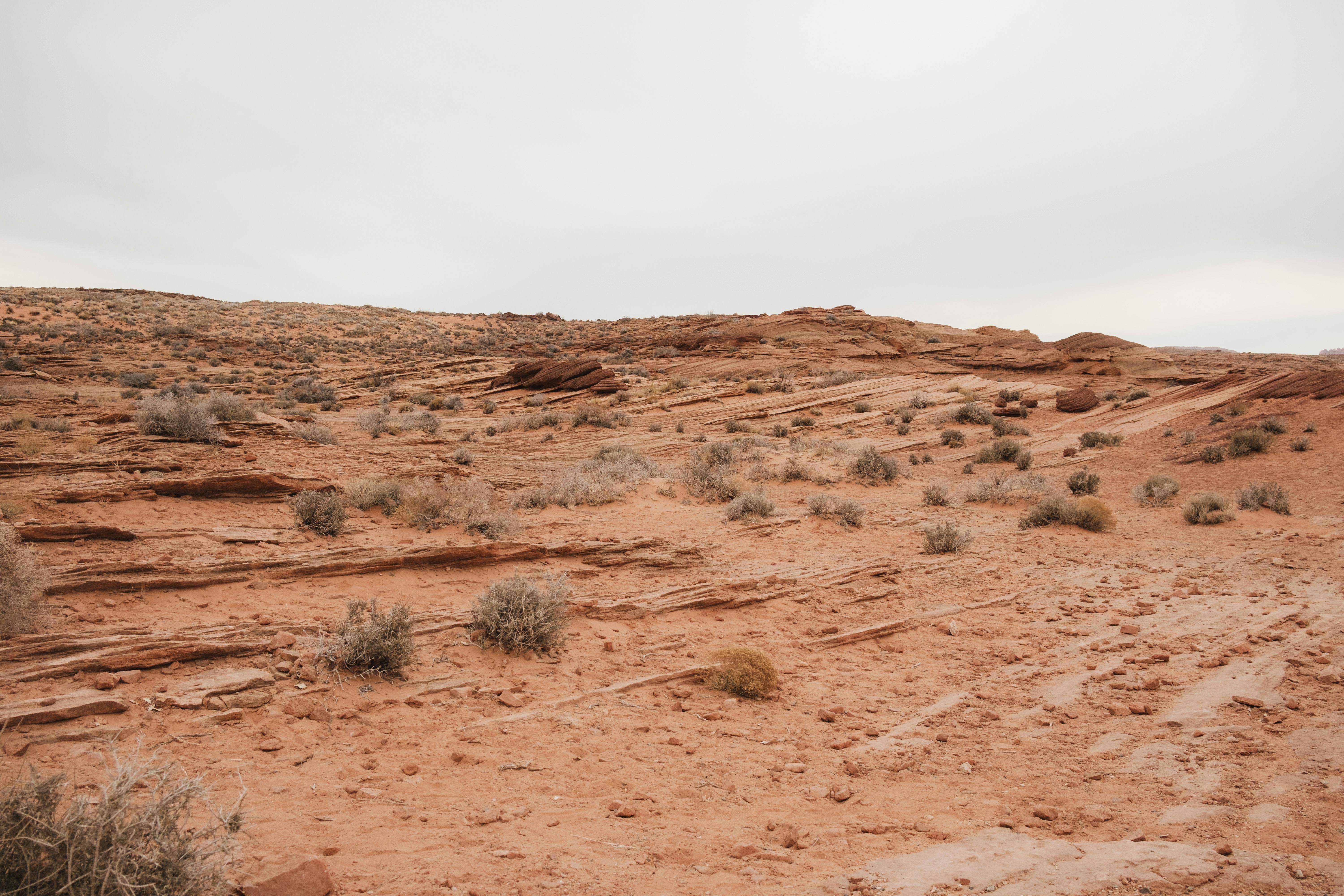 A desert landscape with rocks and dirt · Free Stock Photo