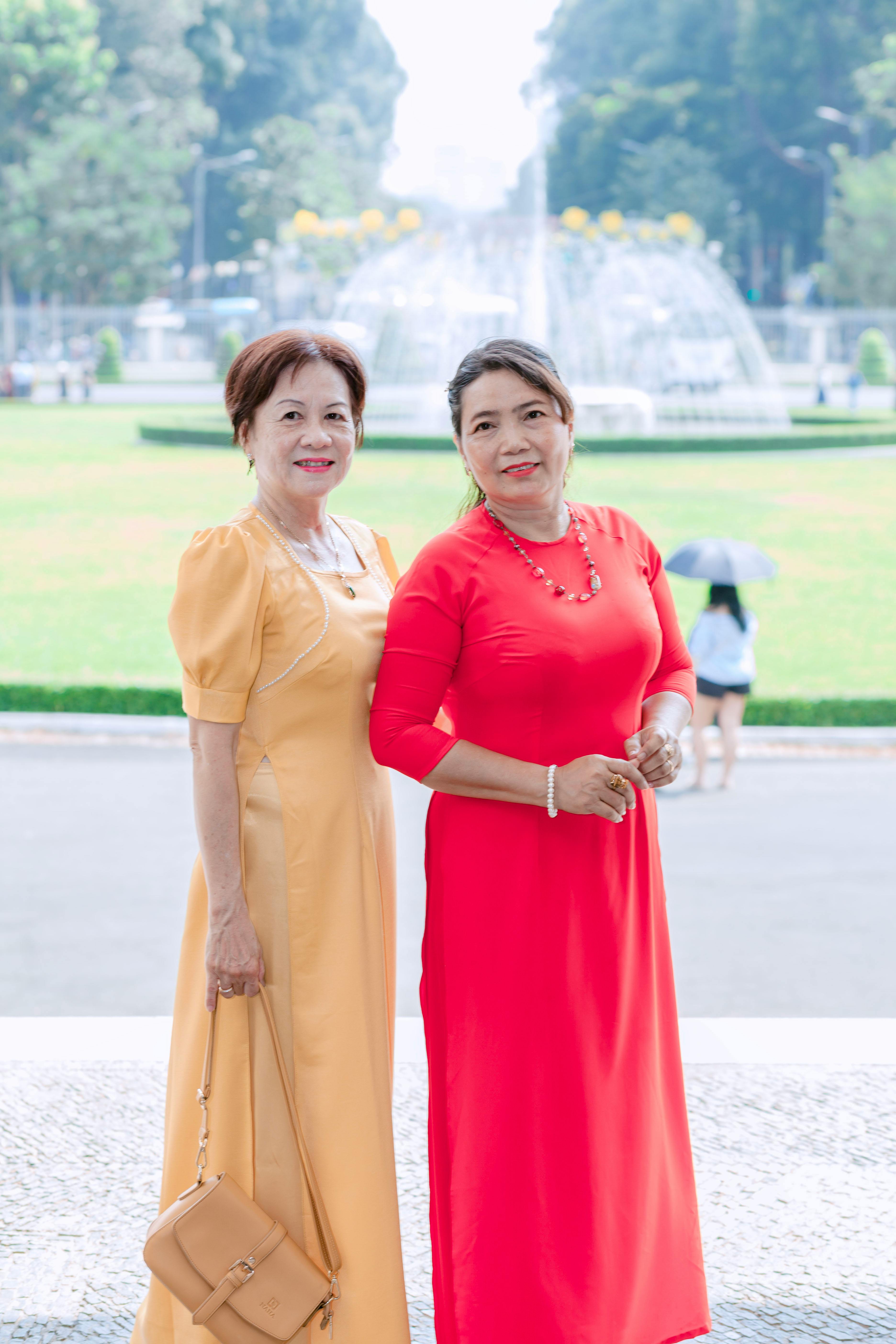 Two Women Wearing Dresses · Free Stock Photo