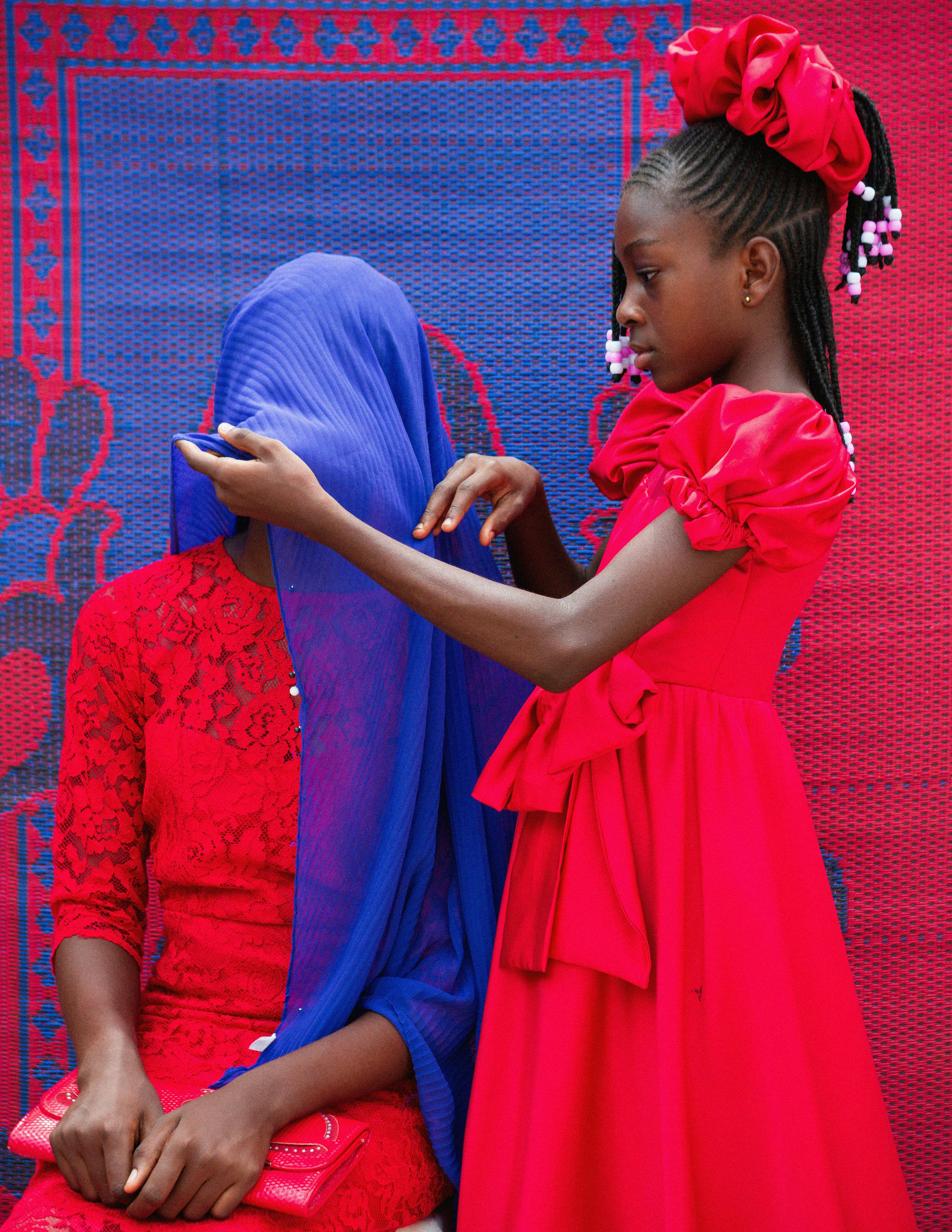 Women in Traditional Red Dresses and with Shawl on Head · Free Stock Photo