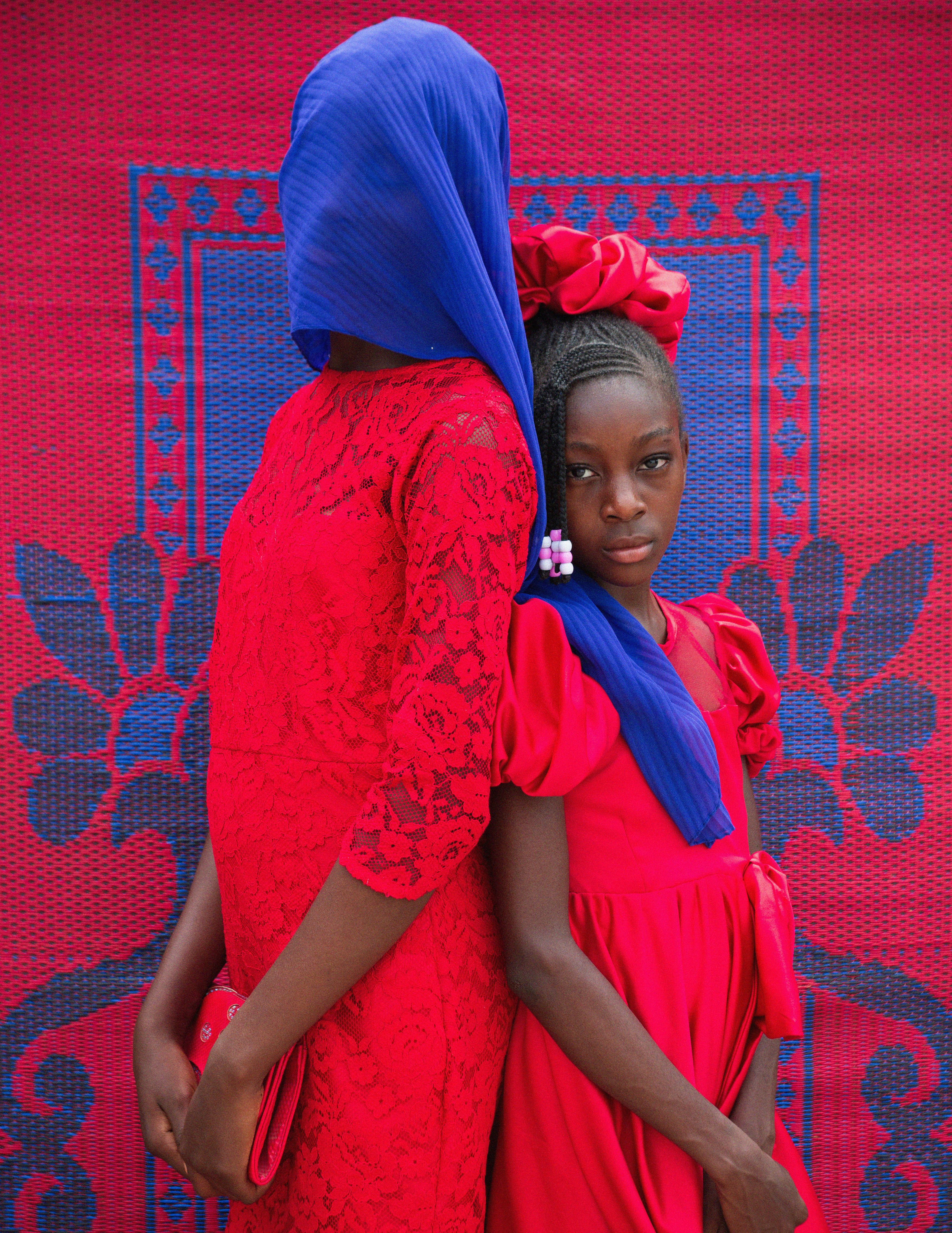Girls in Red Dresses · Free Stock Photo