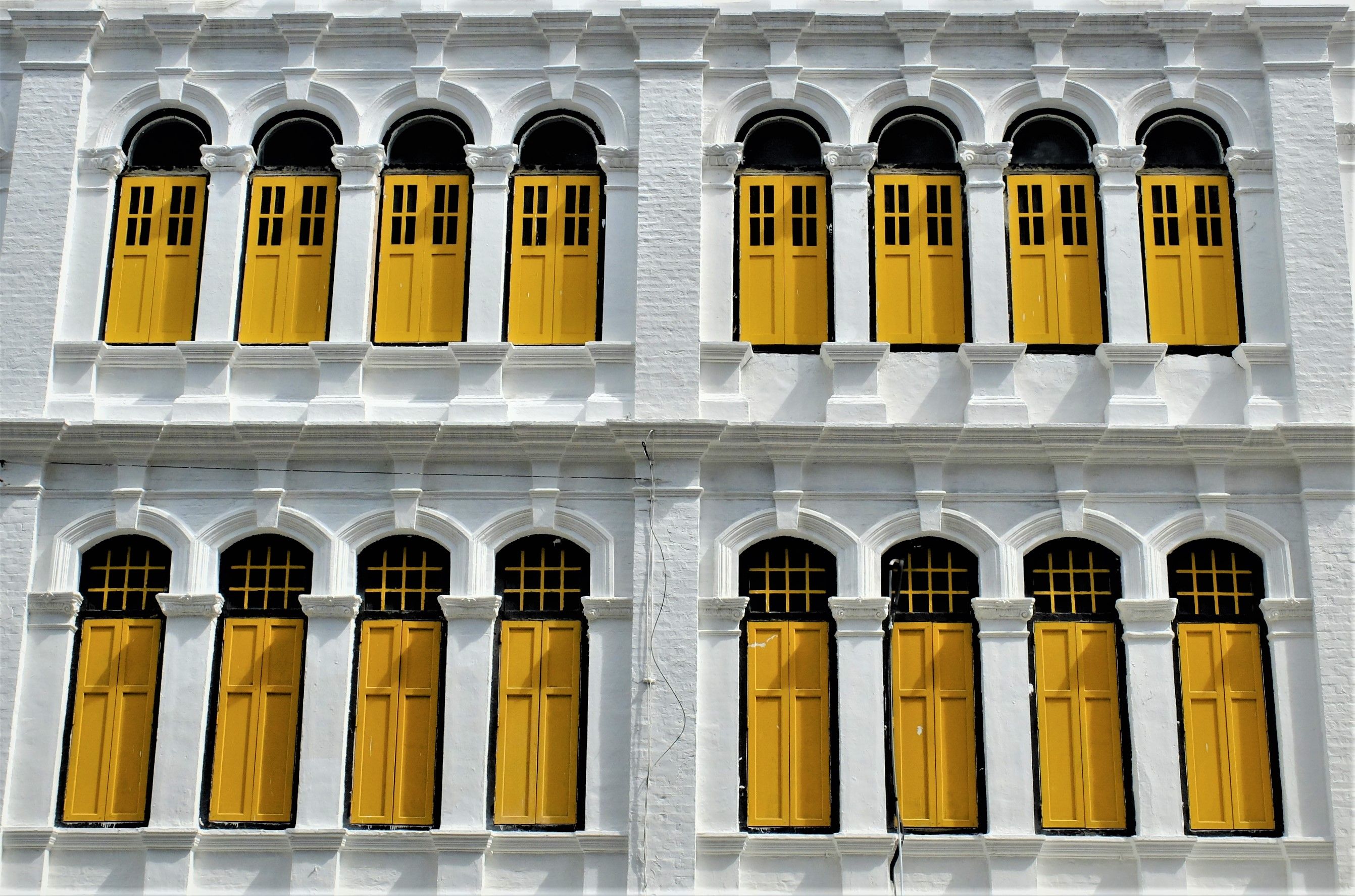 Free stock photo of Round shape windows from old building