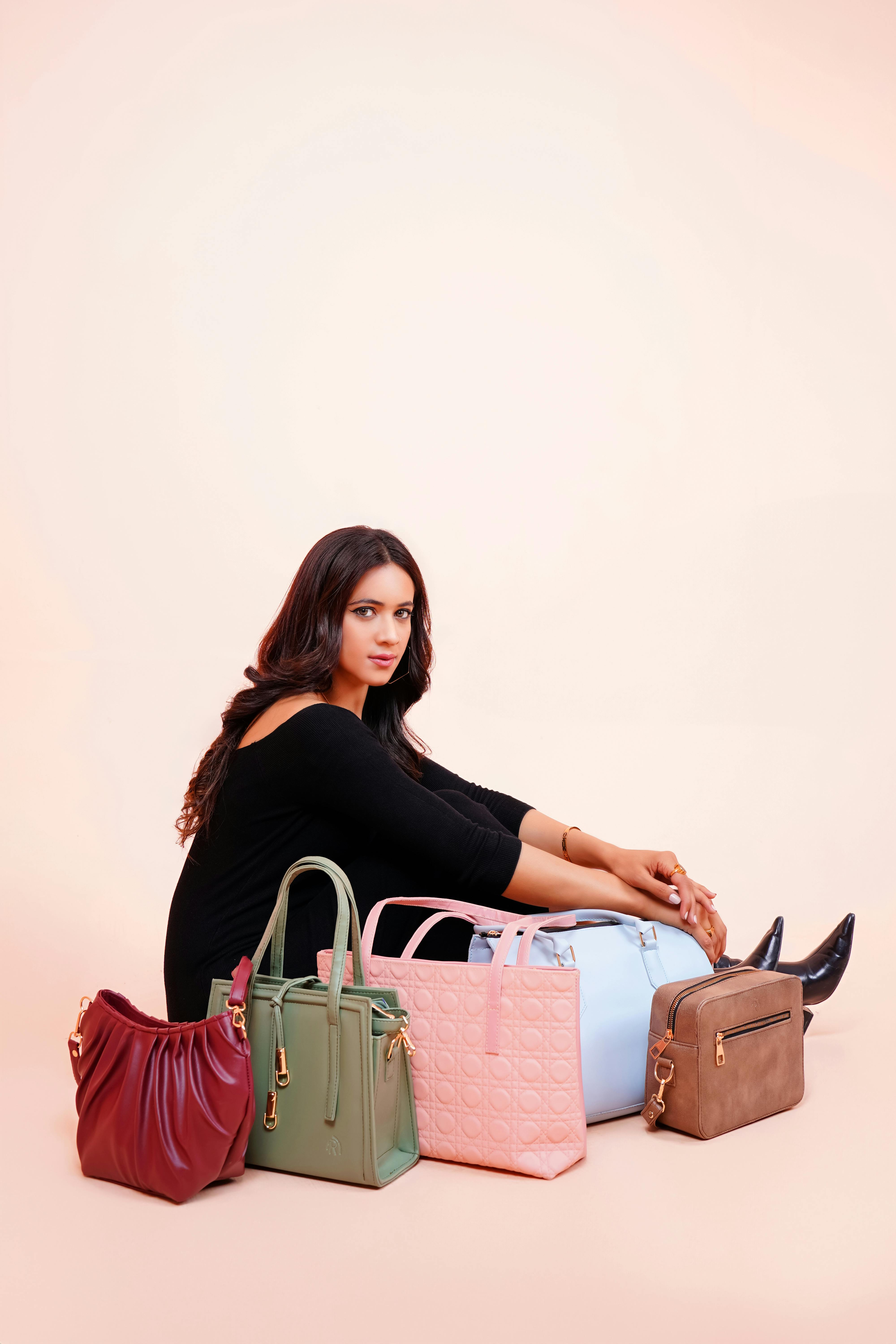 Woman Holding Black Leather Bag · Free Stock Photo