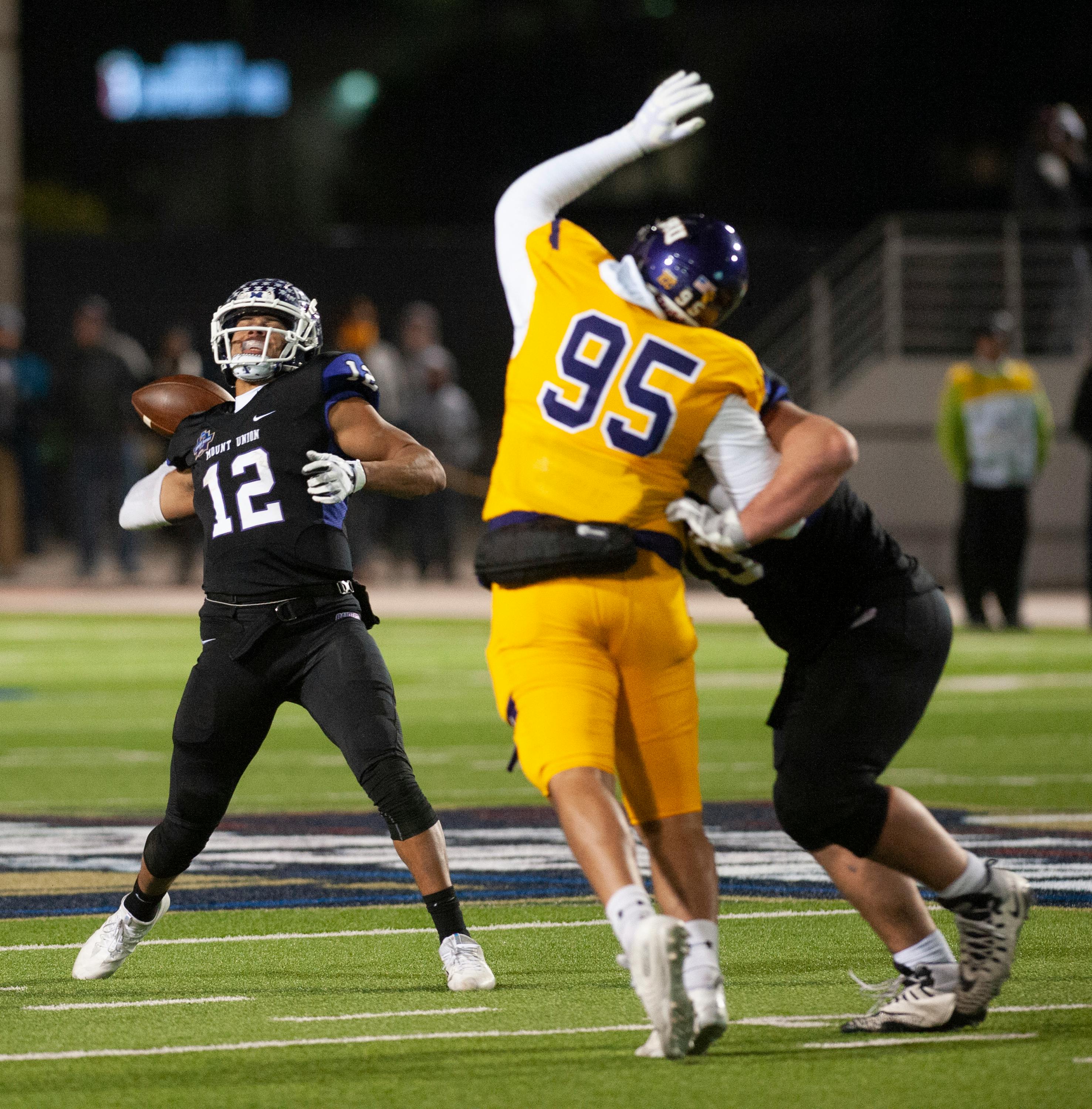 Three Men Playing Football · Free Stock Photo