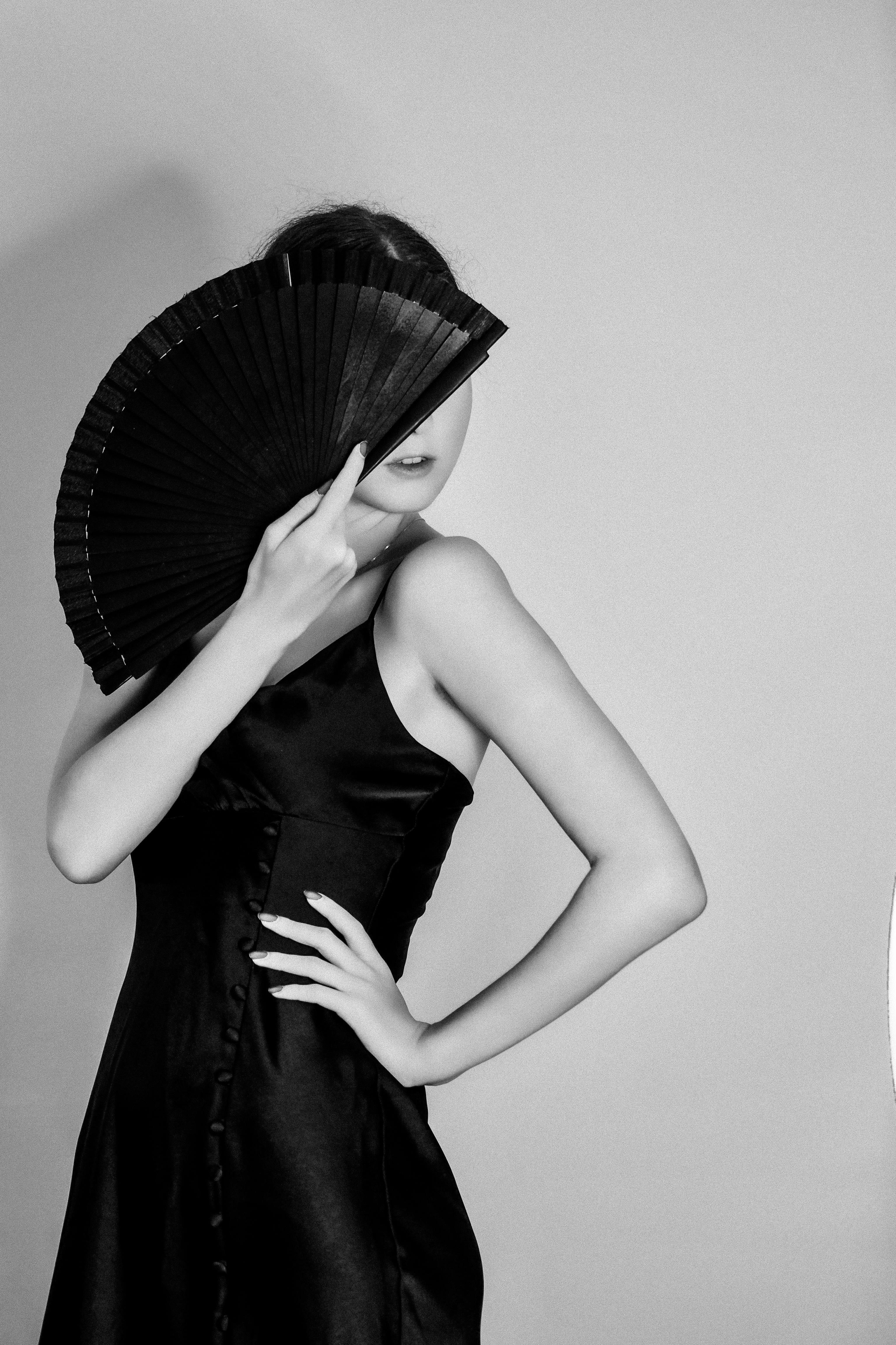 Black and White Photography of a Woman Covering Her Face with a Hand ...