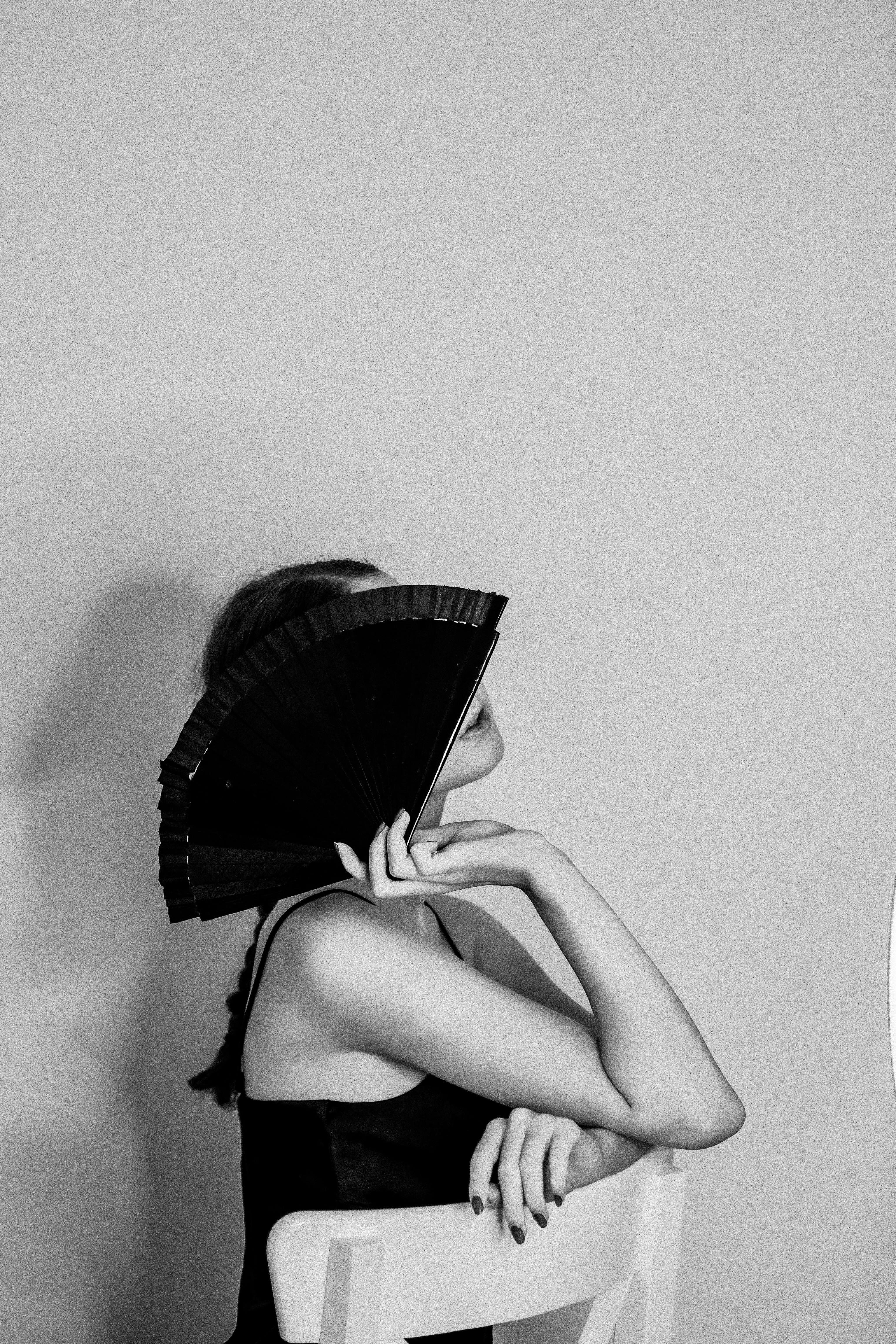 Black and White Photography of a Woman Covering Her Face with a Hand ...