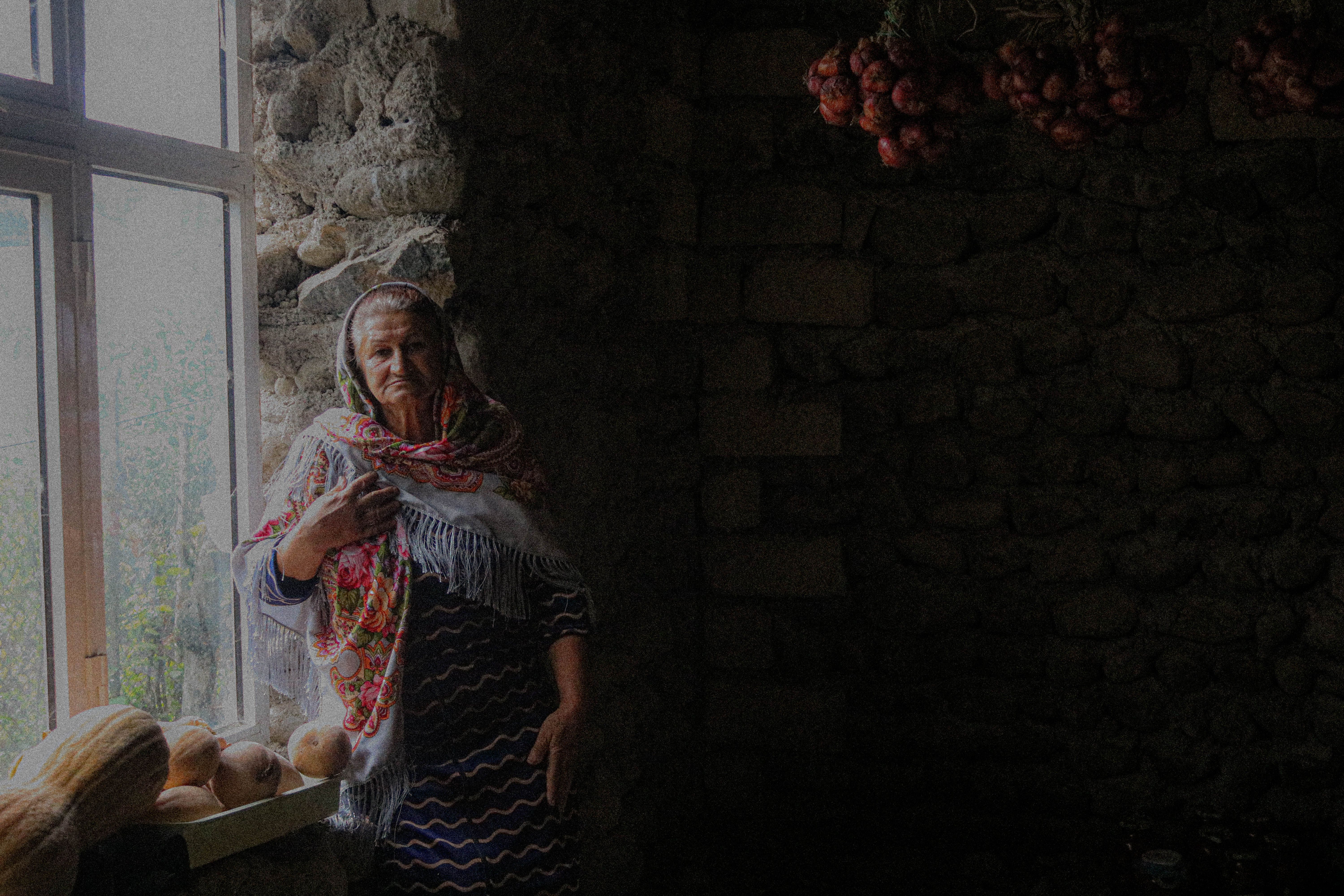 Woman Next to a Window · Free Stock Photo