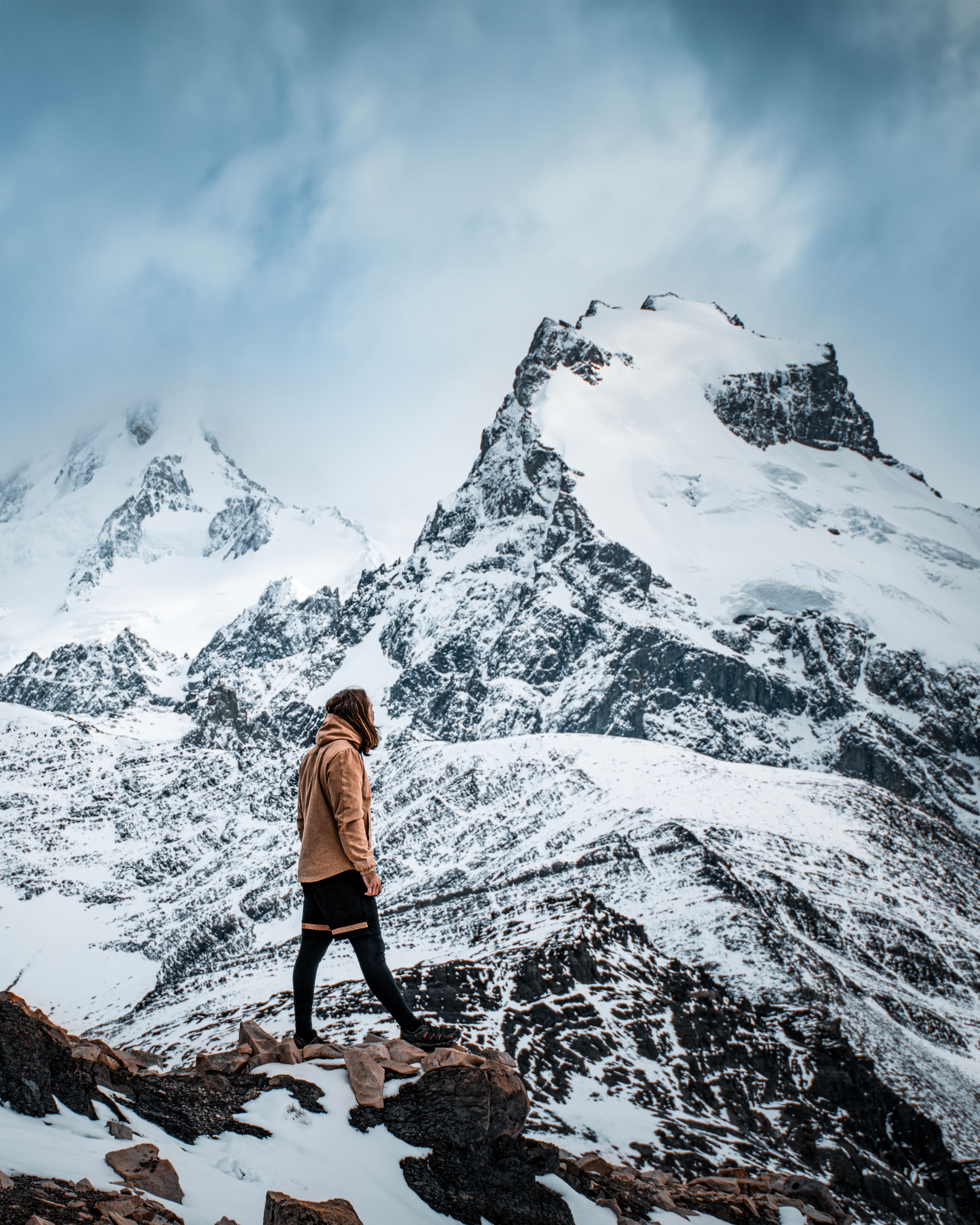 Vertical Shot of a Man Hiking in the Andes · Free Stock Photo
