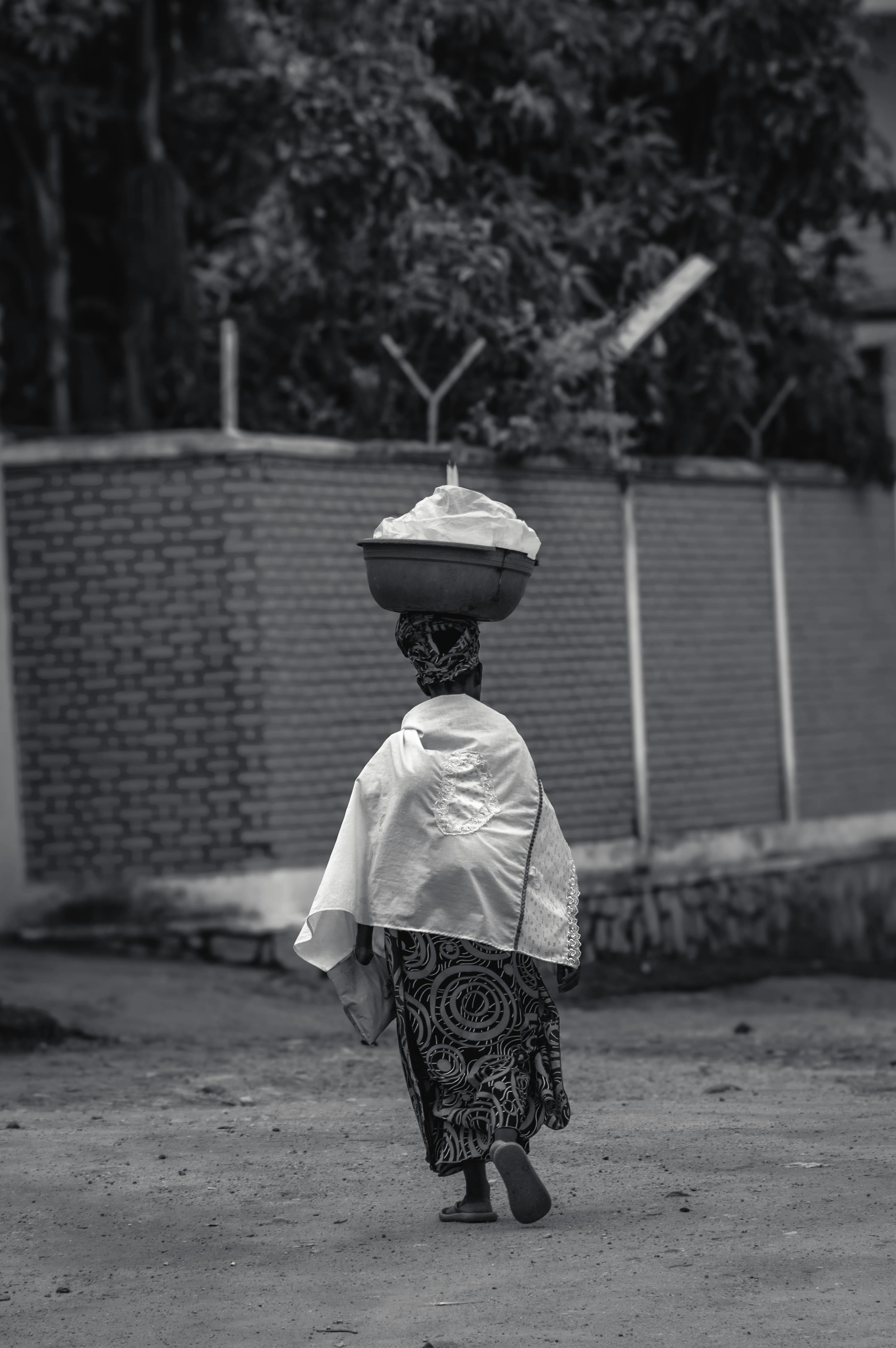 Back View of Woman Head Carrying · Free Stock Photo
