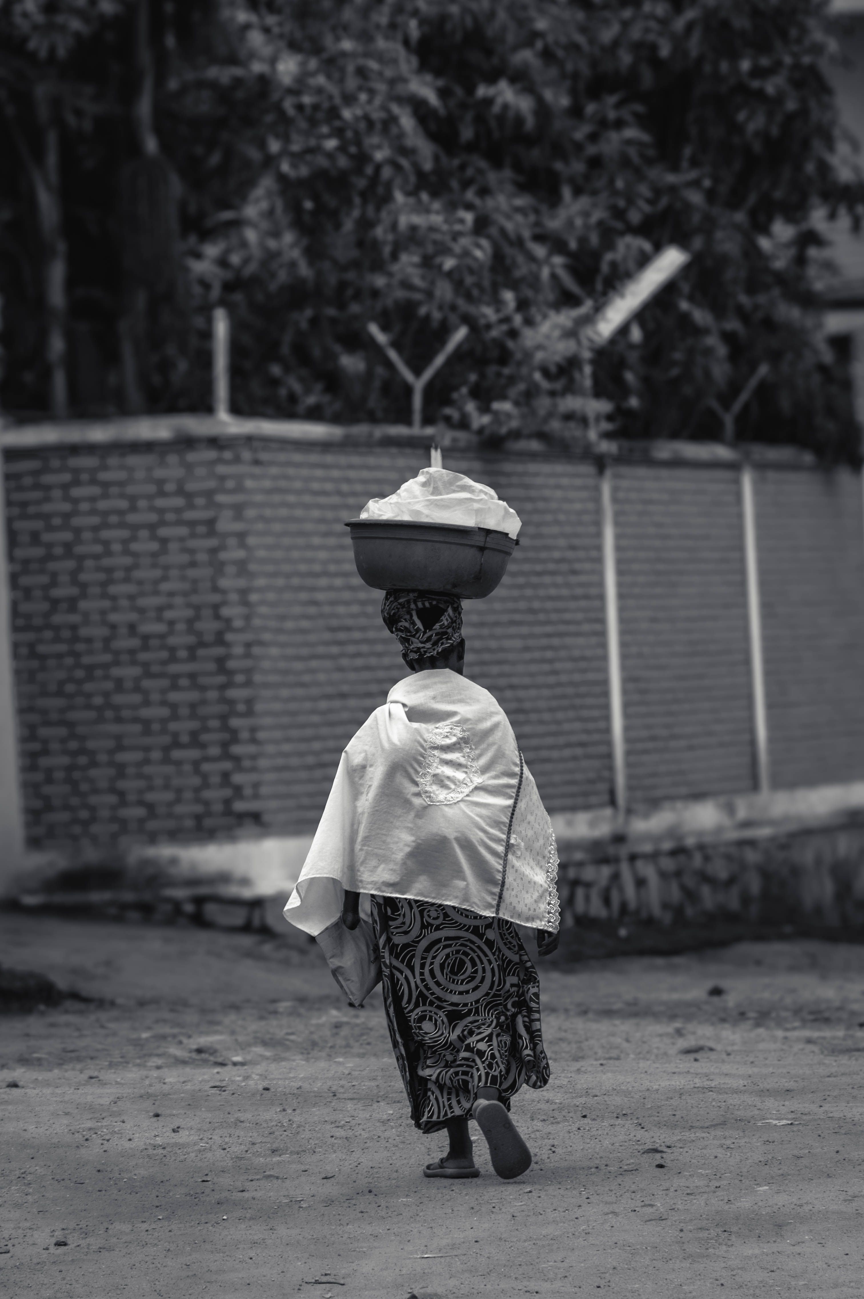 Back View of Woman Head Carrying · Free Stock Photo