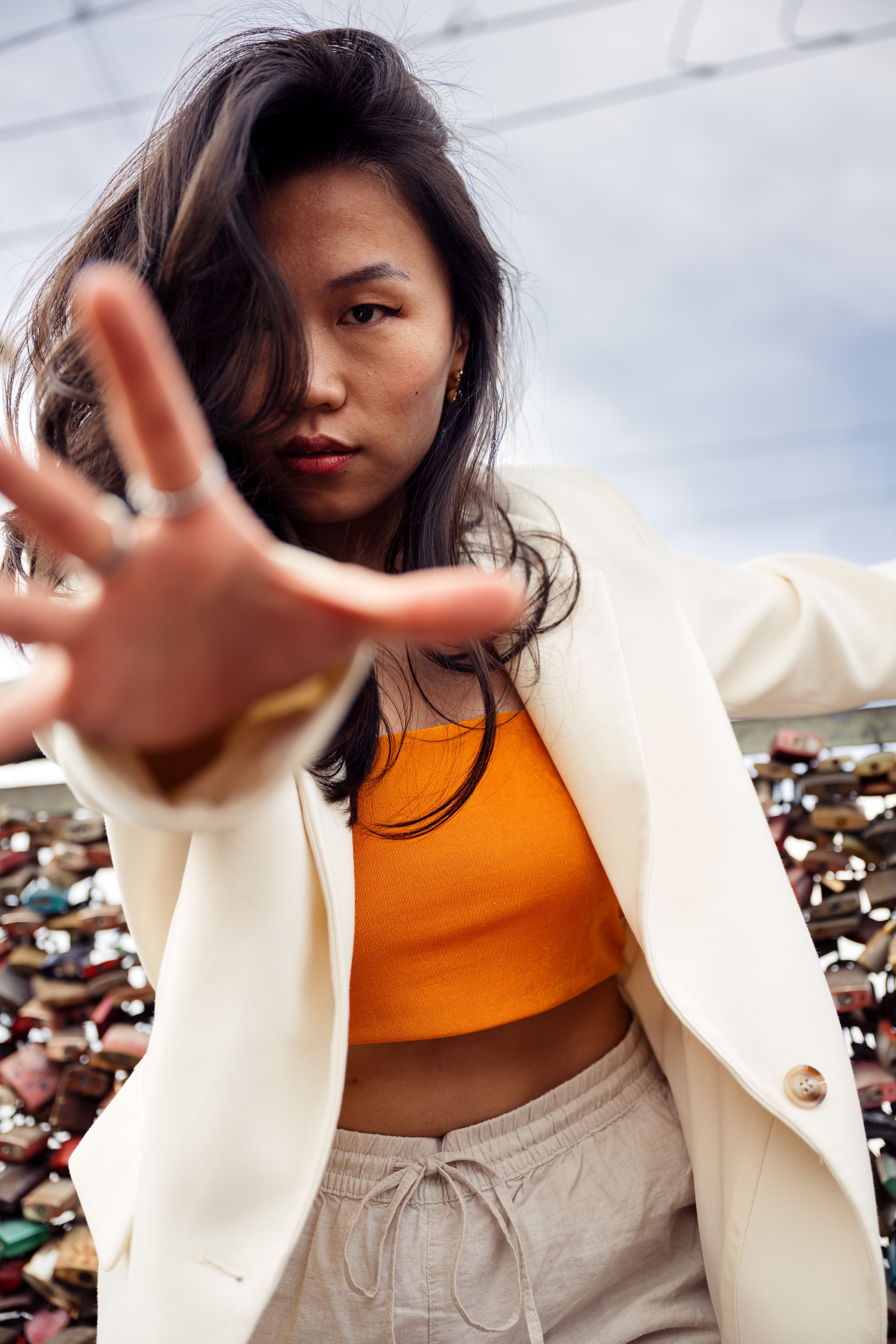 Woman Putting Her Hand In Front Of Her Face Free Stock Photo