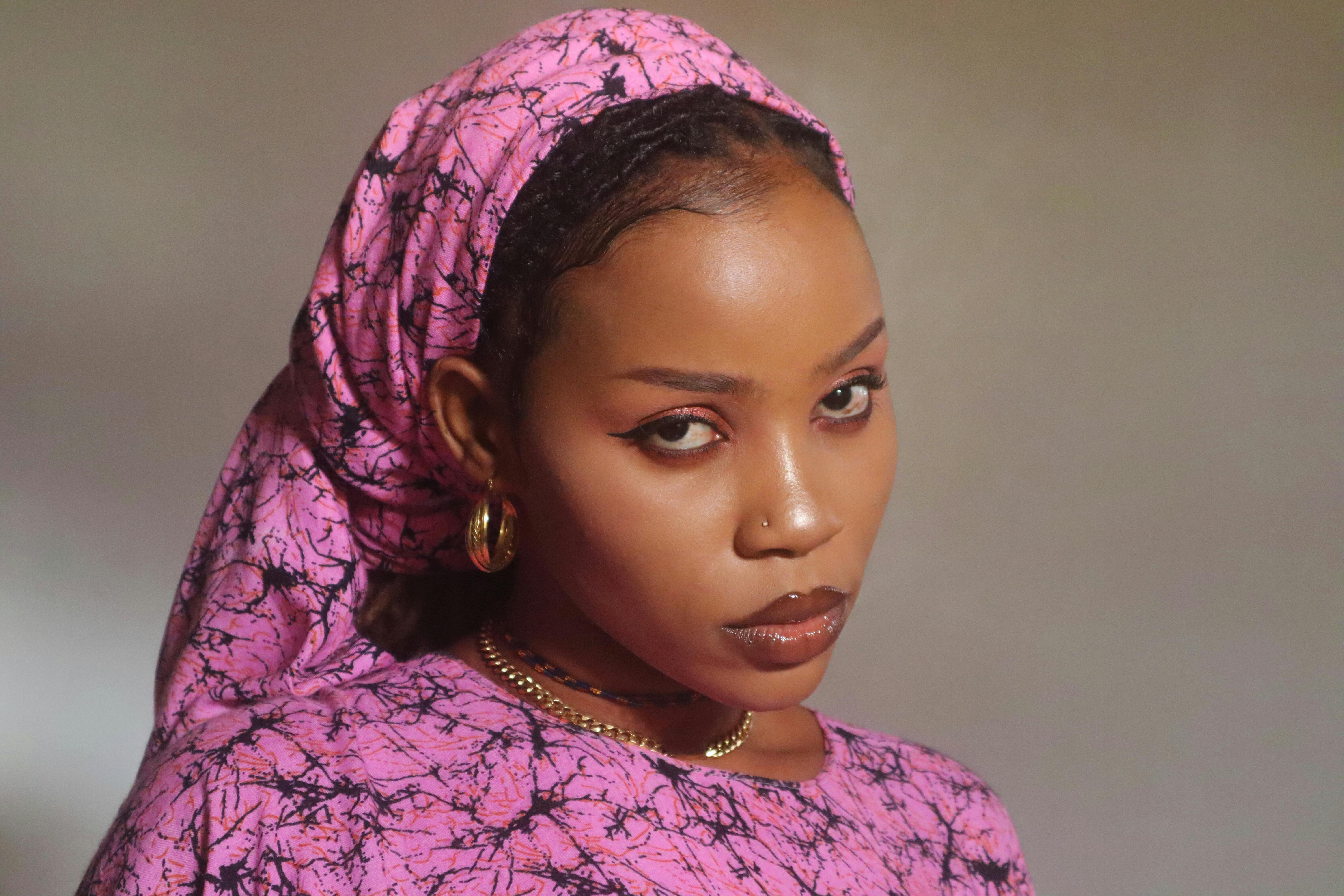 Model in Patterned Headscarf and Dress · Free Stock Photo