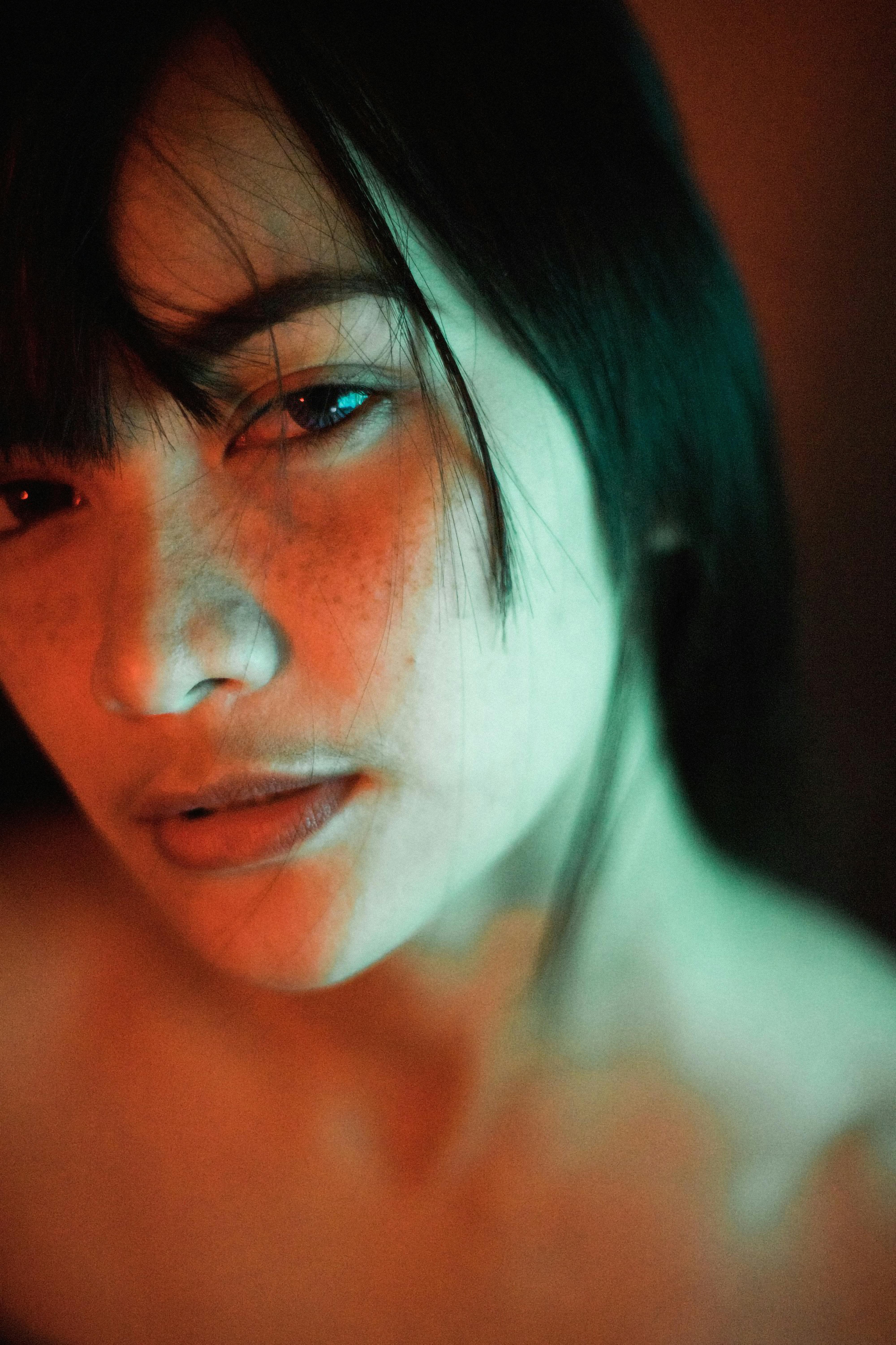 Creative Portrait of a Young Woman in Split Lighting · Free Stock Photo