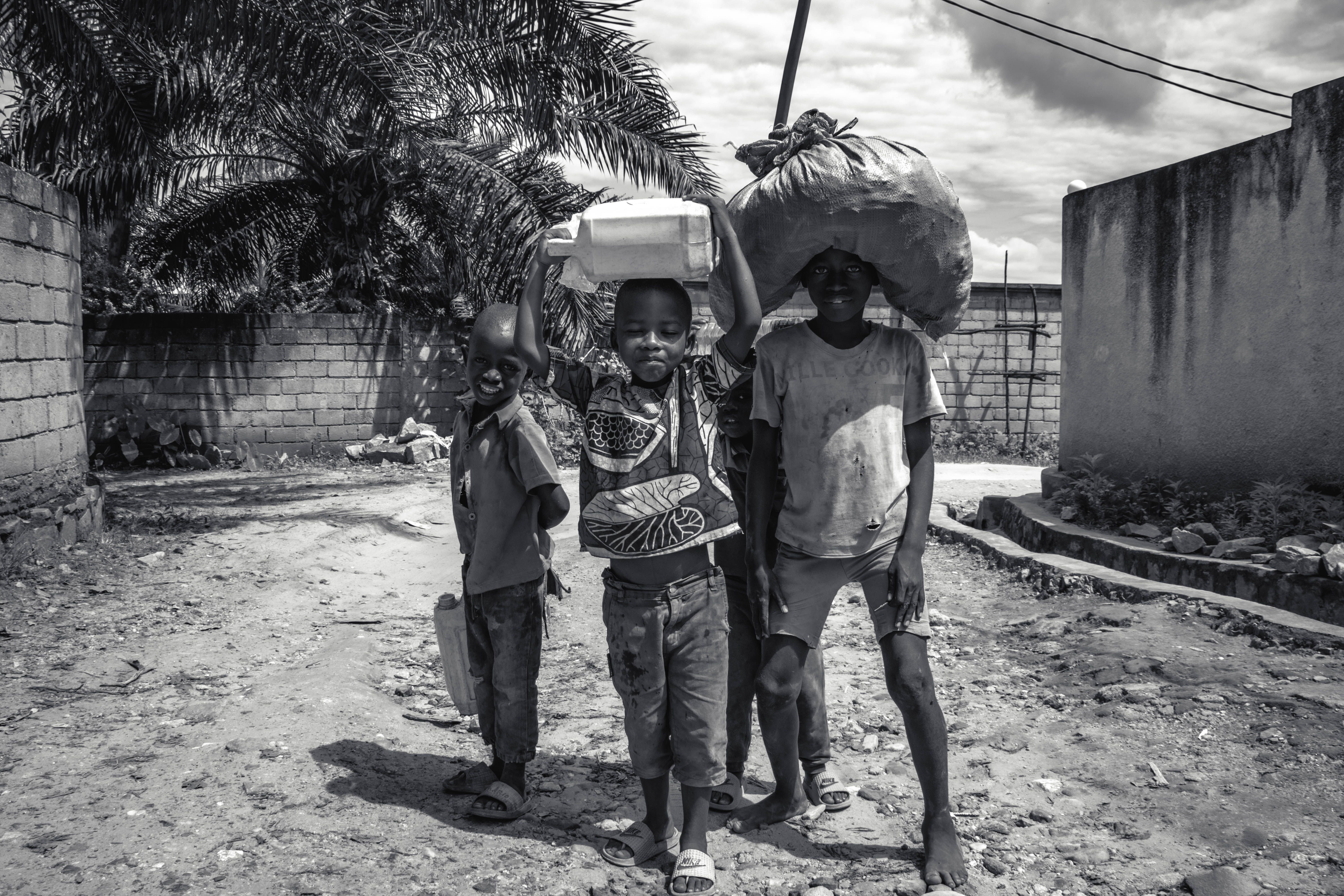 Boys Carrying Goods · Free Stock Photo