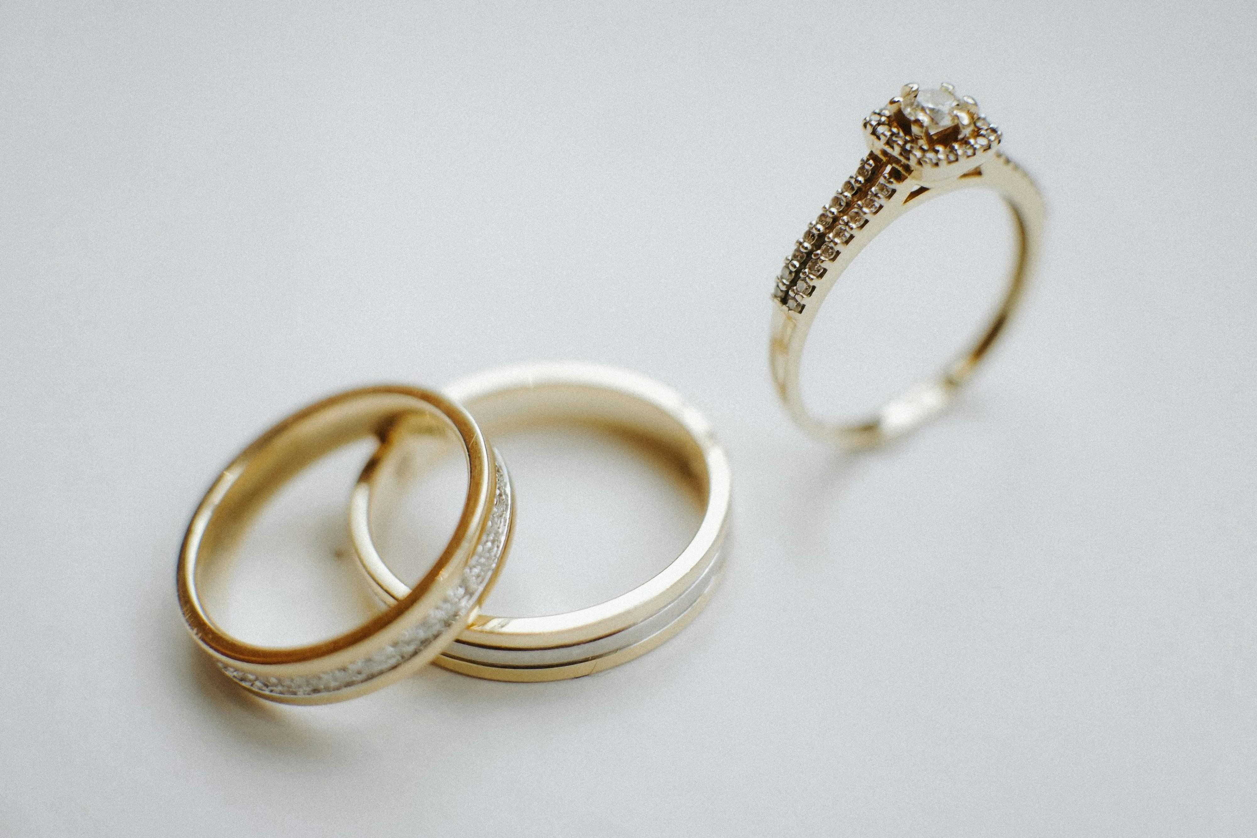Close-Up Photo of Gold Wedding Rings · Free Stock Photo