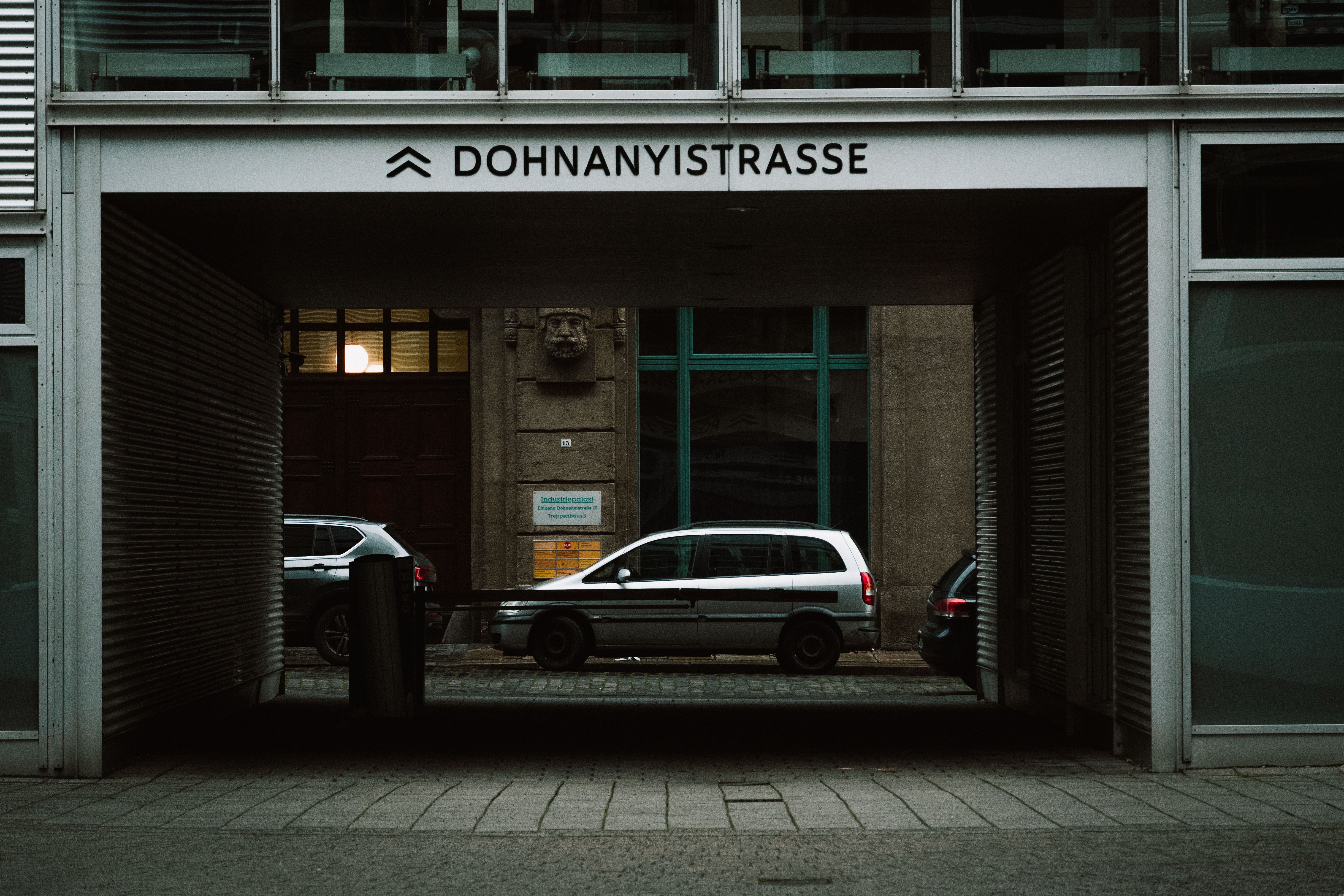 Car on Street behind Building · Free Stock Photo