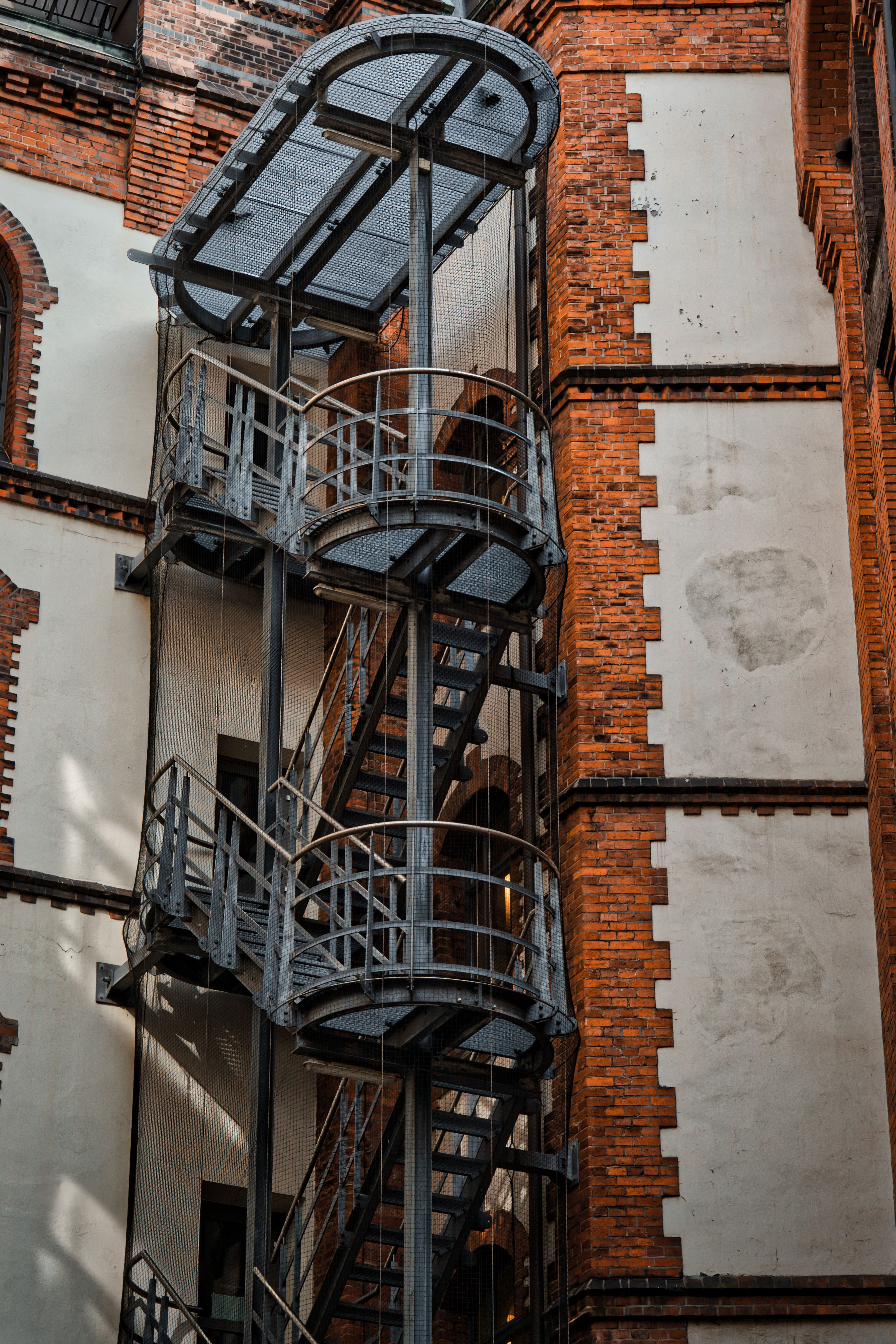 Metal Stairs on Building Wall · Free Stock Photo