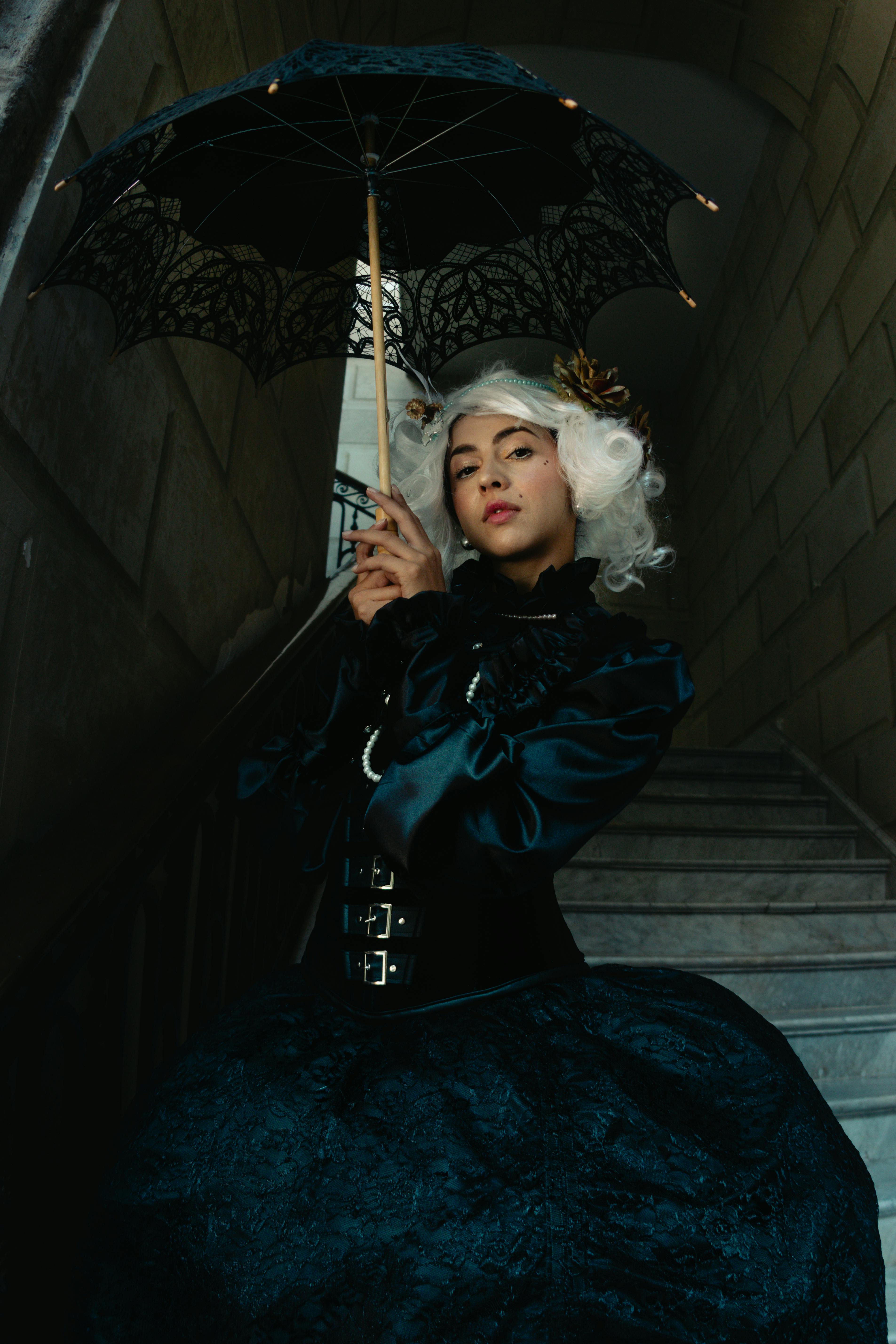 Victorian Style Model Posing with Umbrella · Free Stock Photo