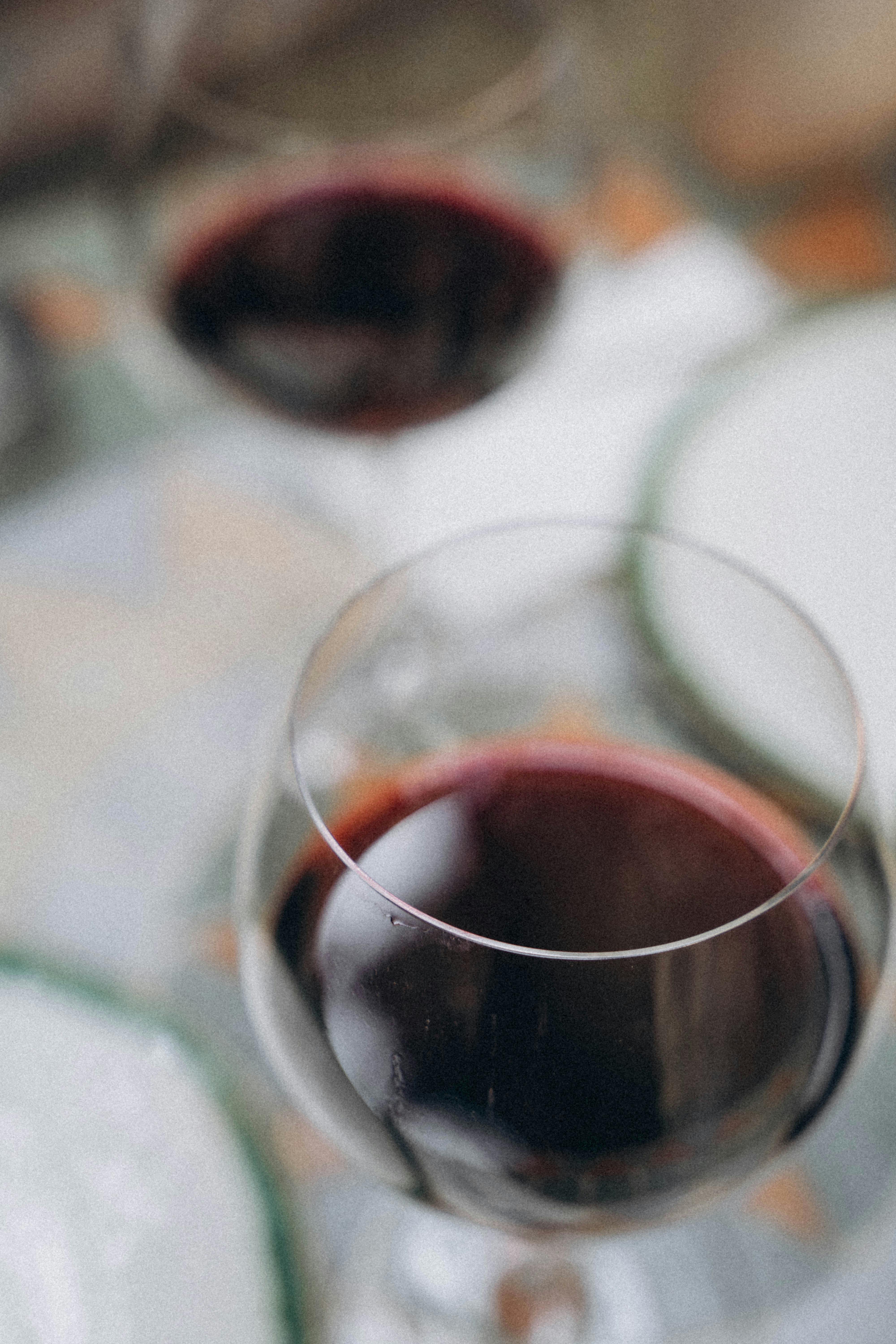 Elegant Pouring of Red Wine into Glass · Free Stock Photo