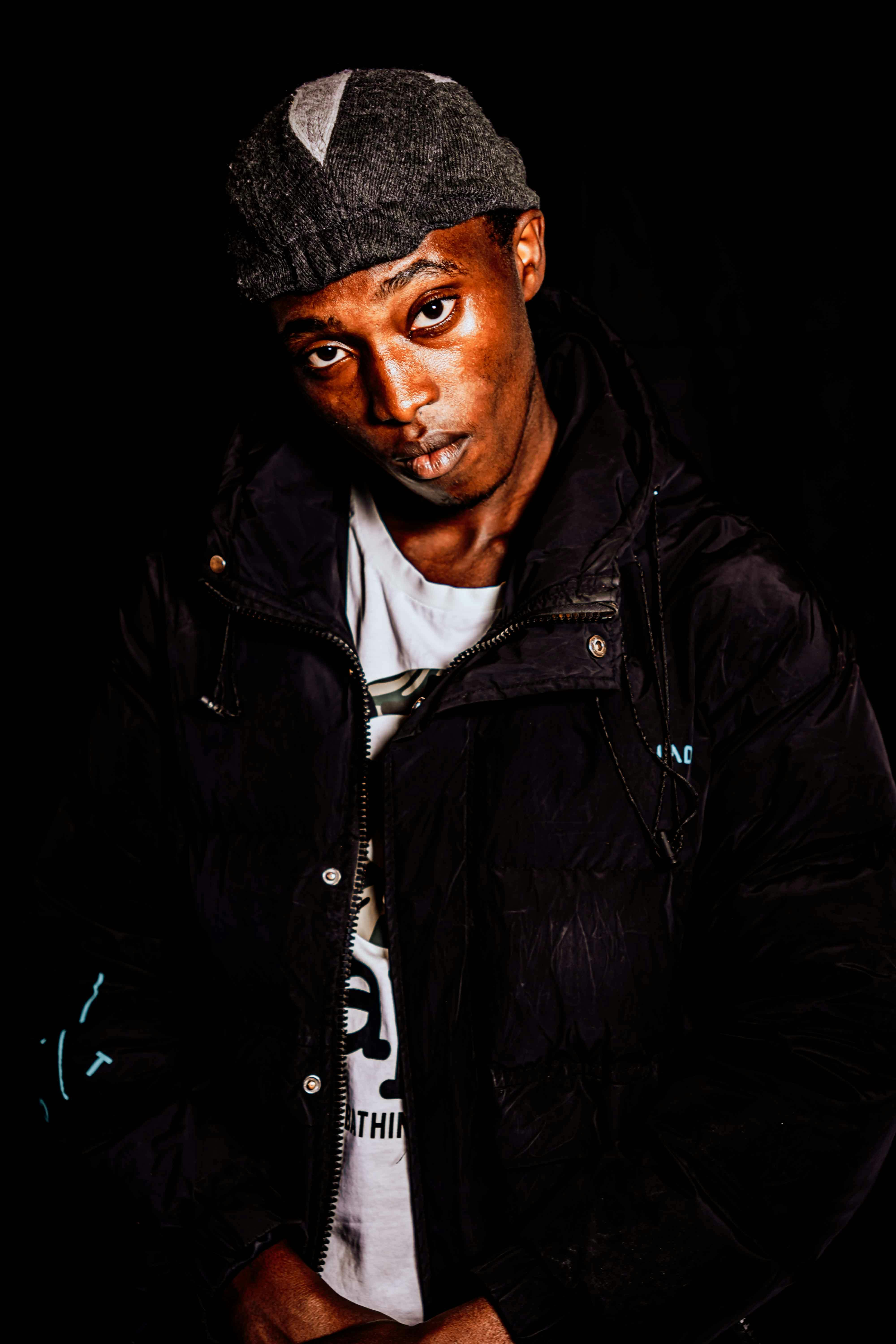 Male Model Wearing a Flat Cap and a Black Jacket · Free Stock Photo