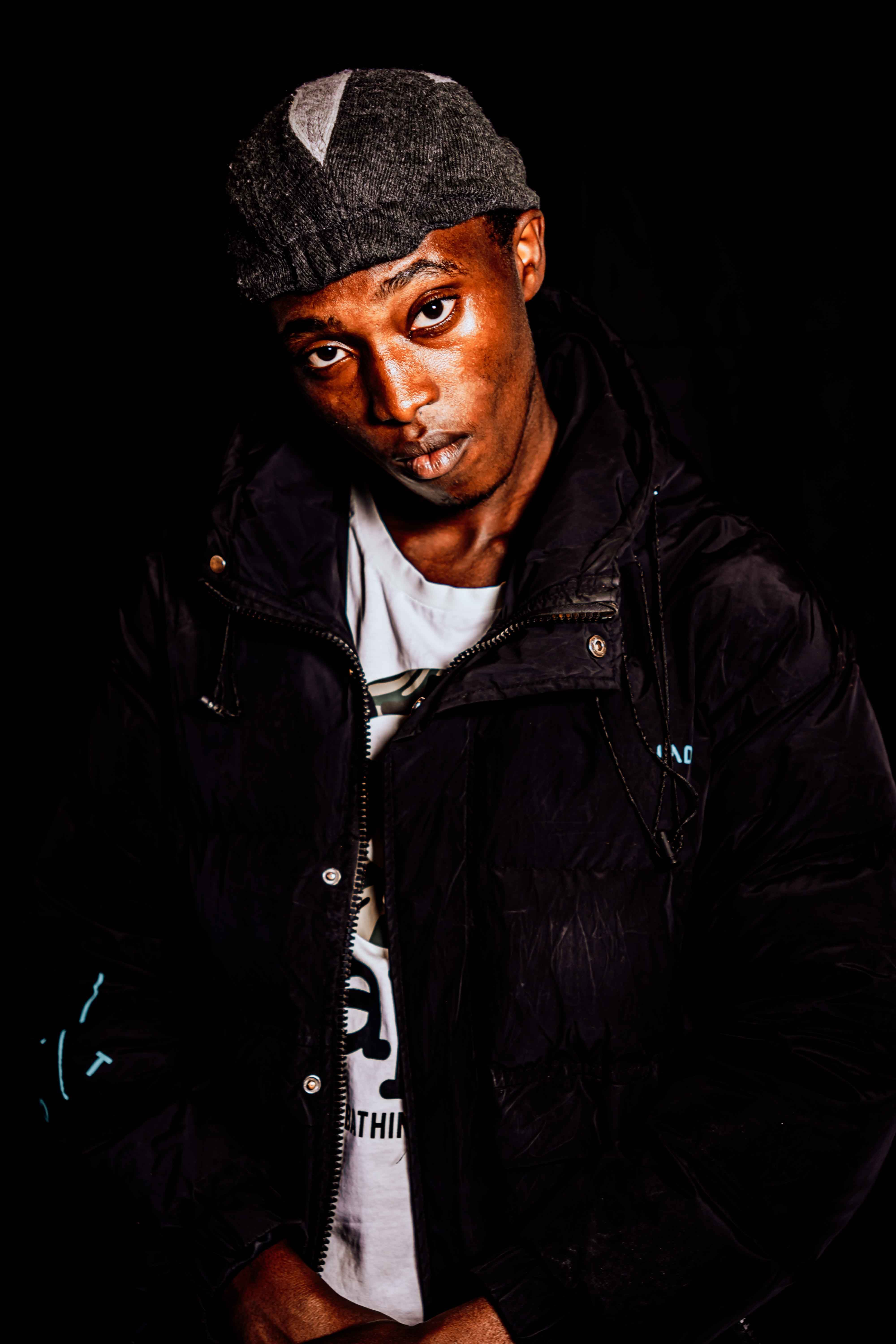 Male Model Wearing a Flat Cap and a Black Jacket · Free Stock Photo