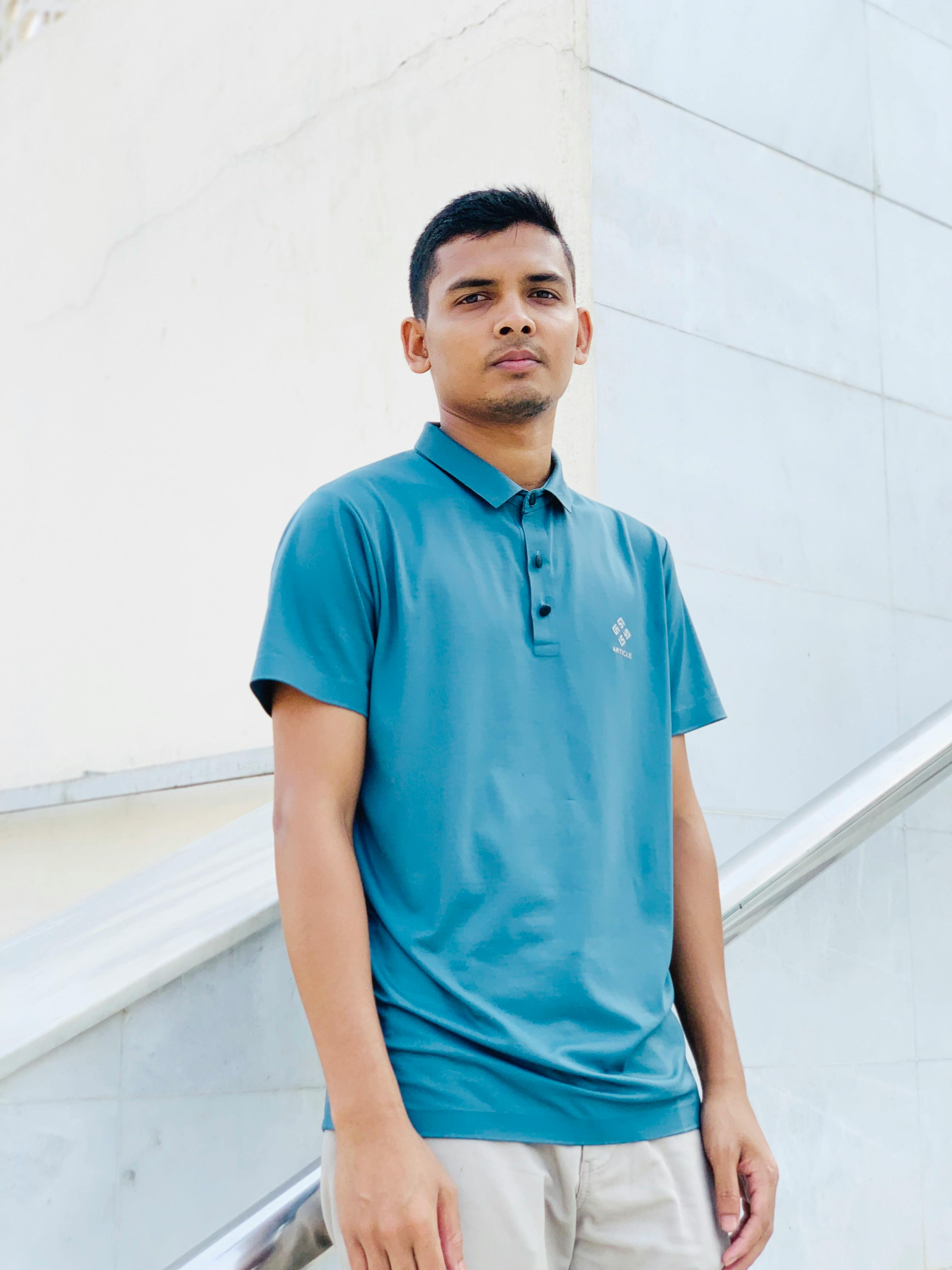 Young Man Standing and Posing · Free Stock Photo