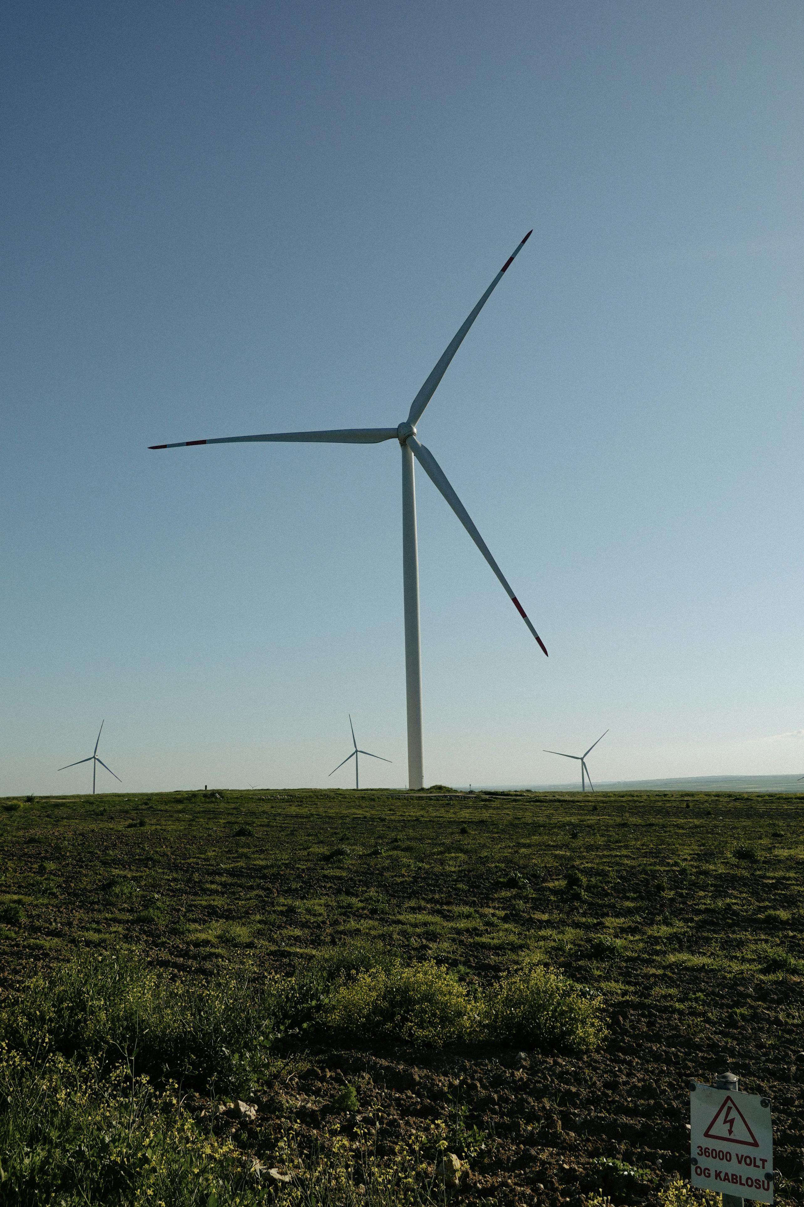 View of a Wind Turbine on a Hill · Free Stock Photo