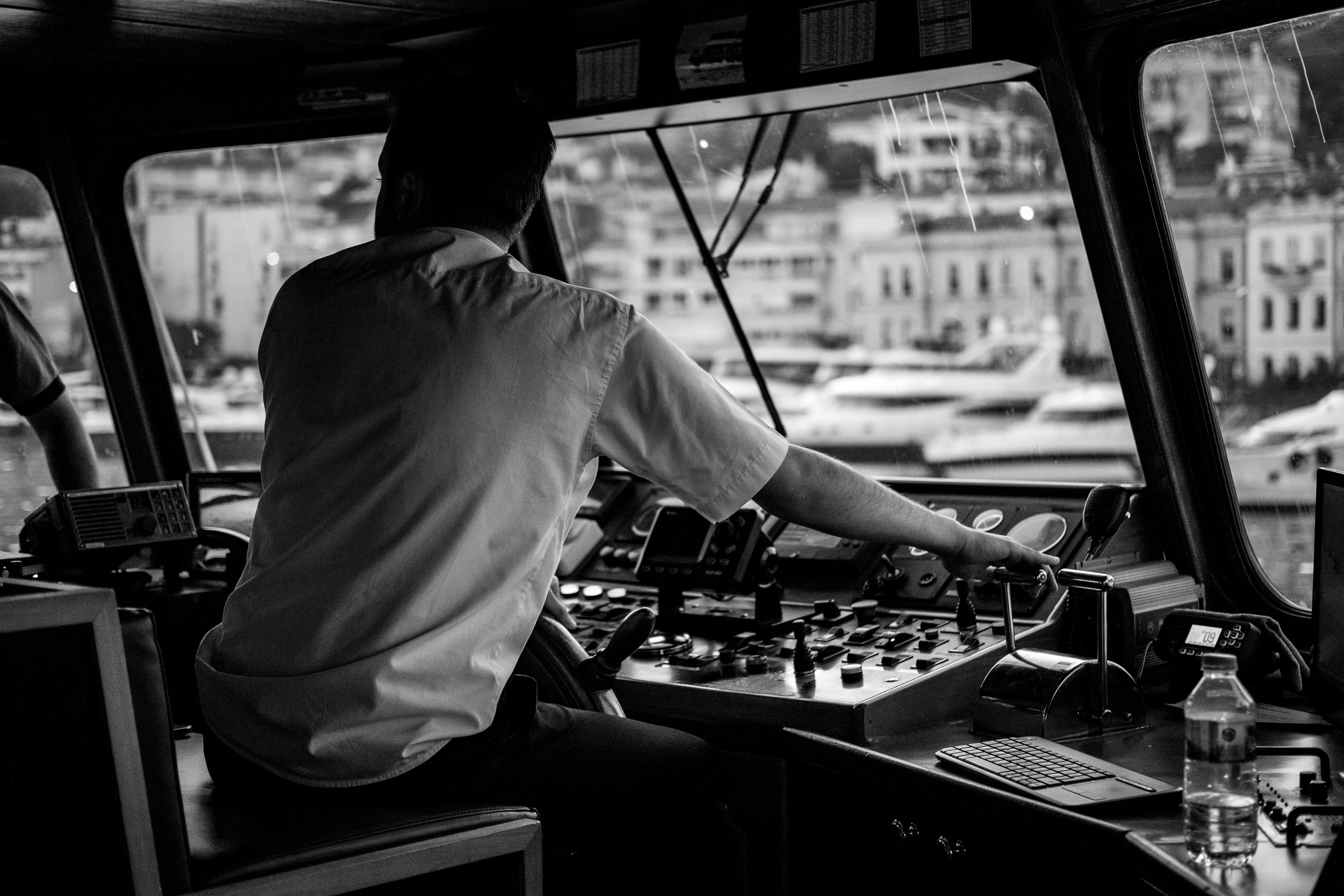 Navigator Sitting in Vessel Cockpit · Free Stock Photo