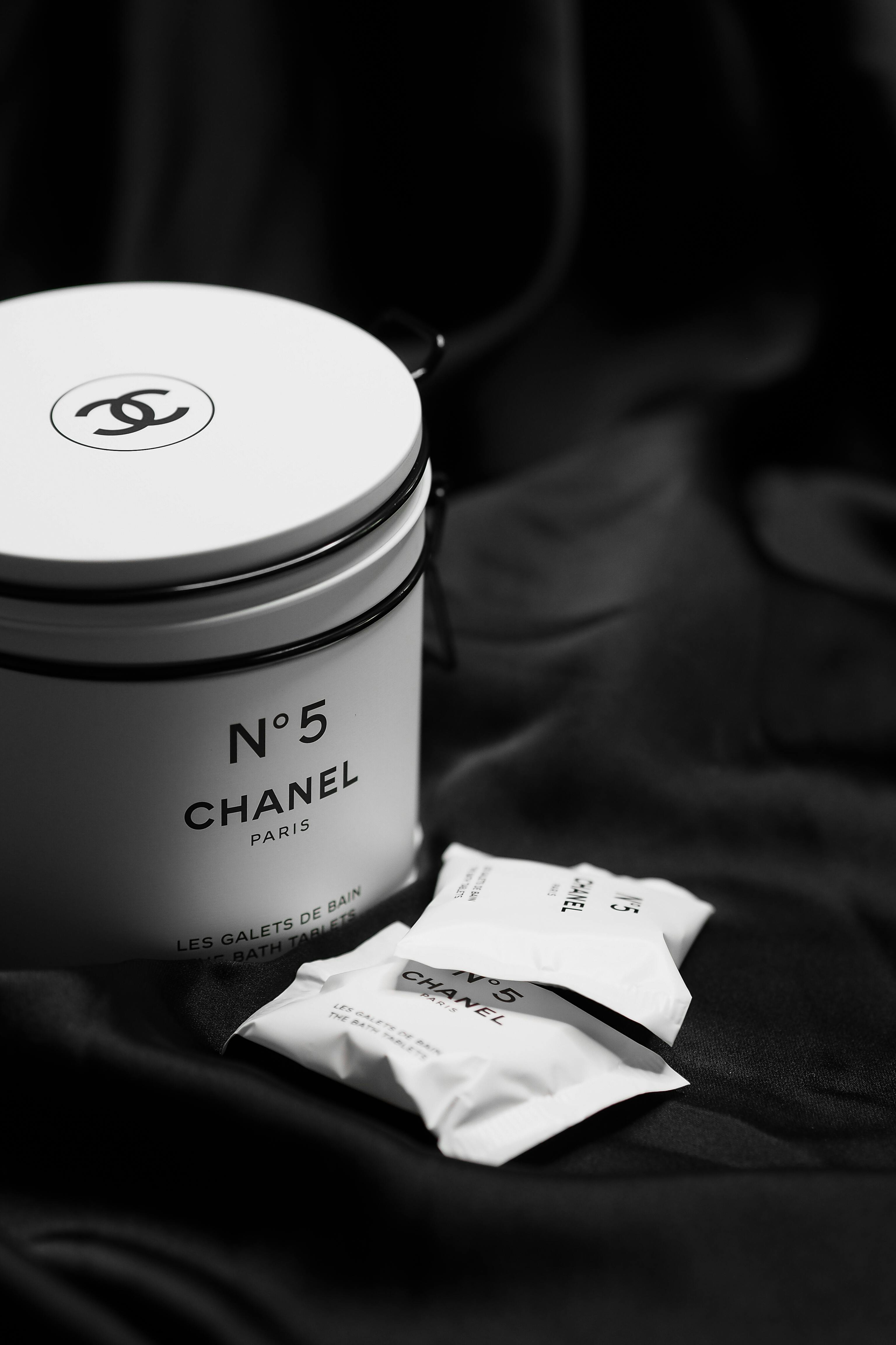 Bath Tablets Chanel No 5 Sachets in Front of the Bucket · Free Stock Photo
