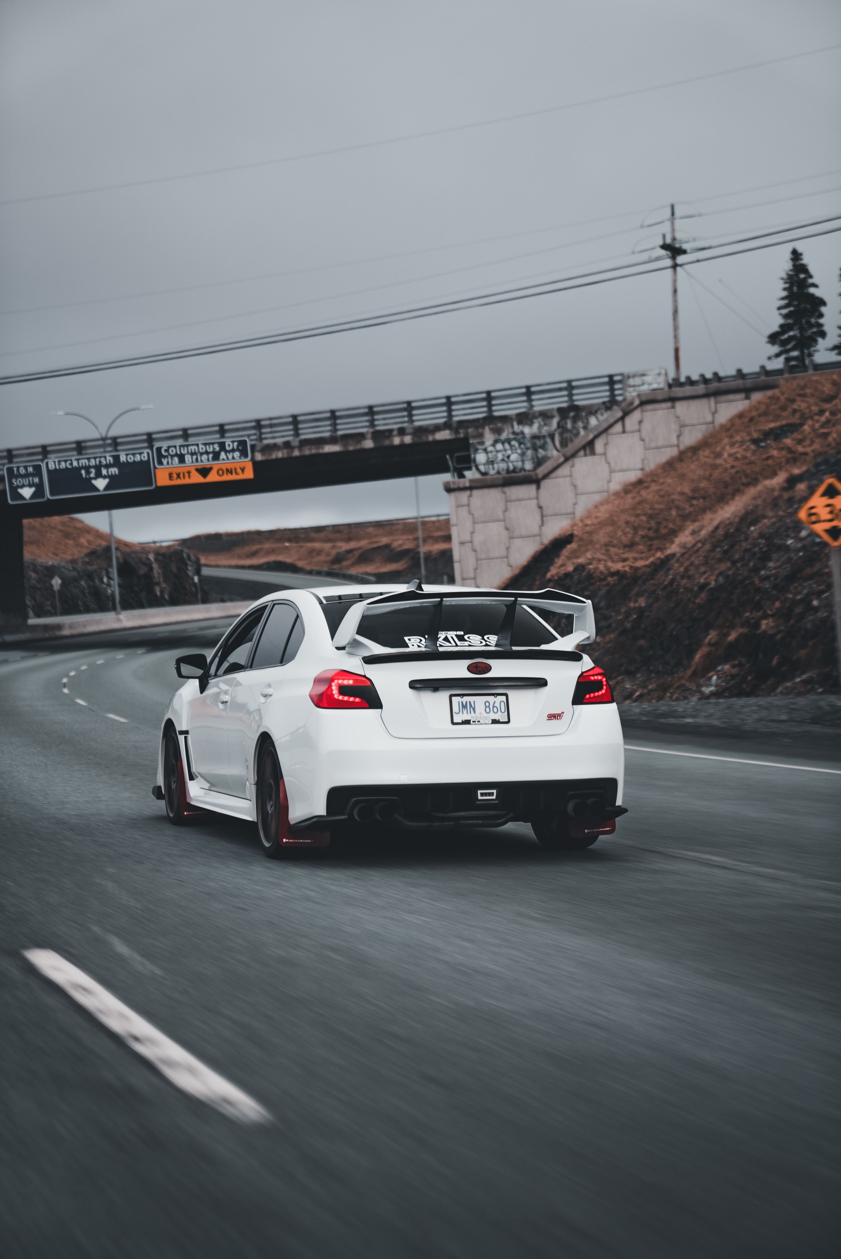 Back View of White Subaru WRX on Road · Free Stock Photo