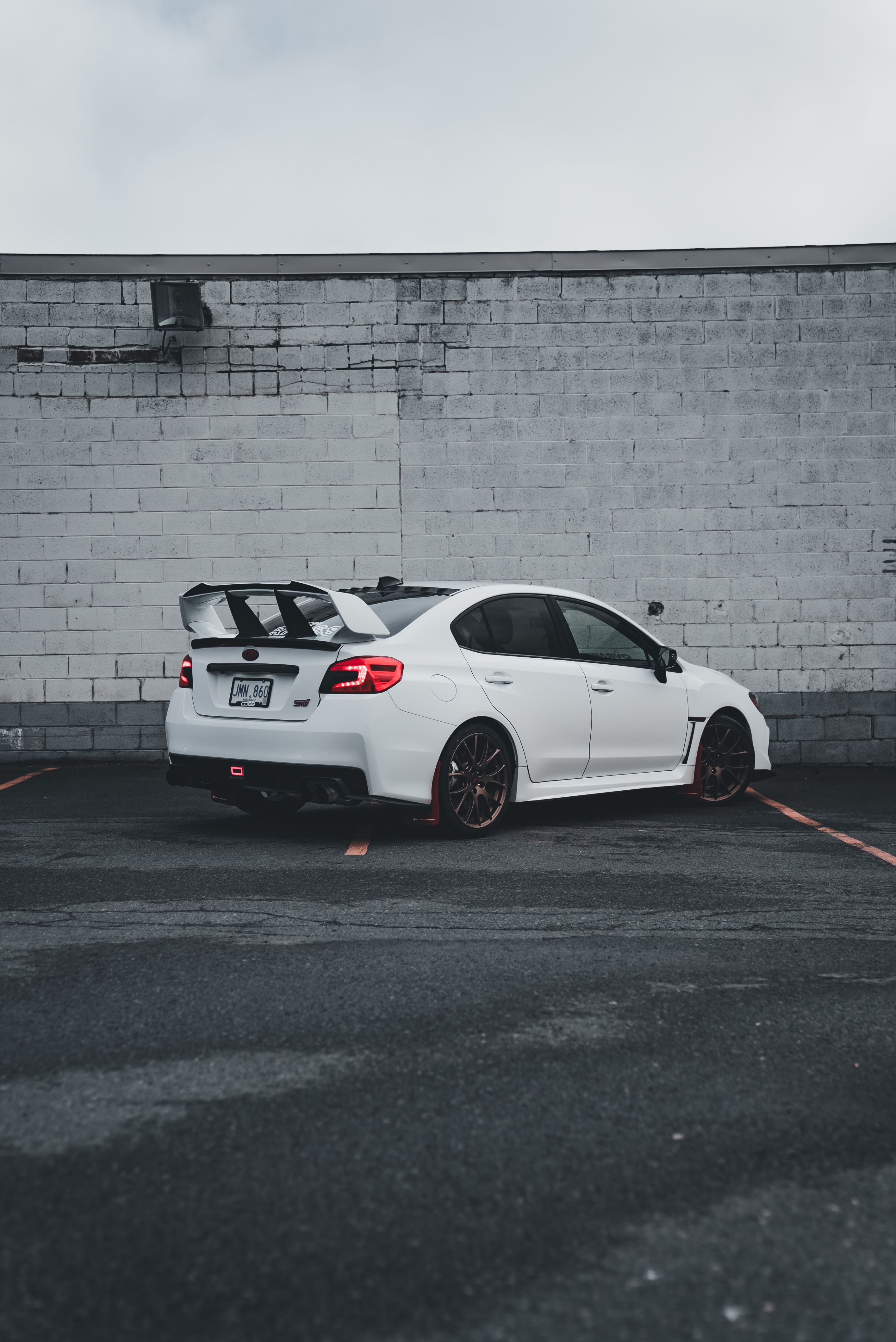White Car Parking on the Road at Daytime · Free Stock Photo