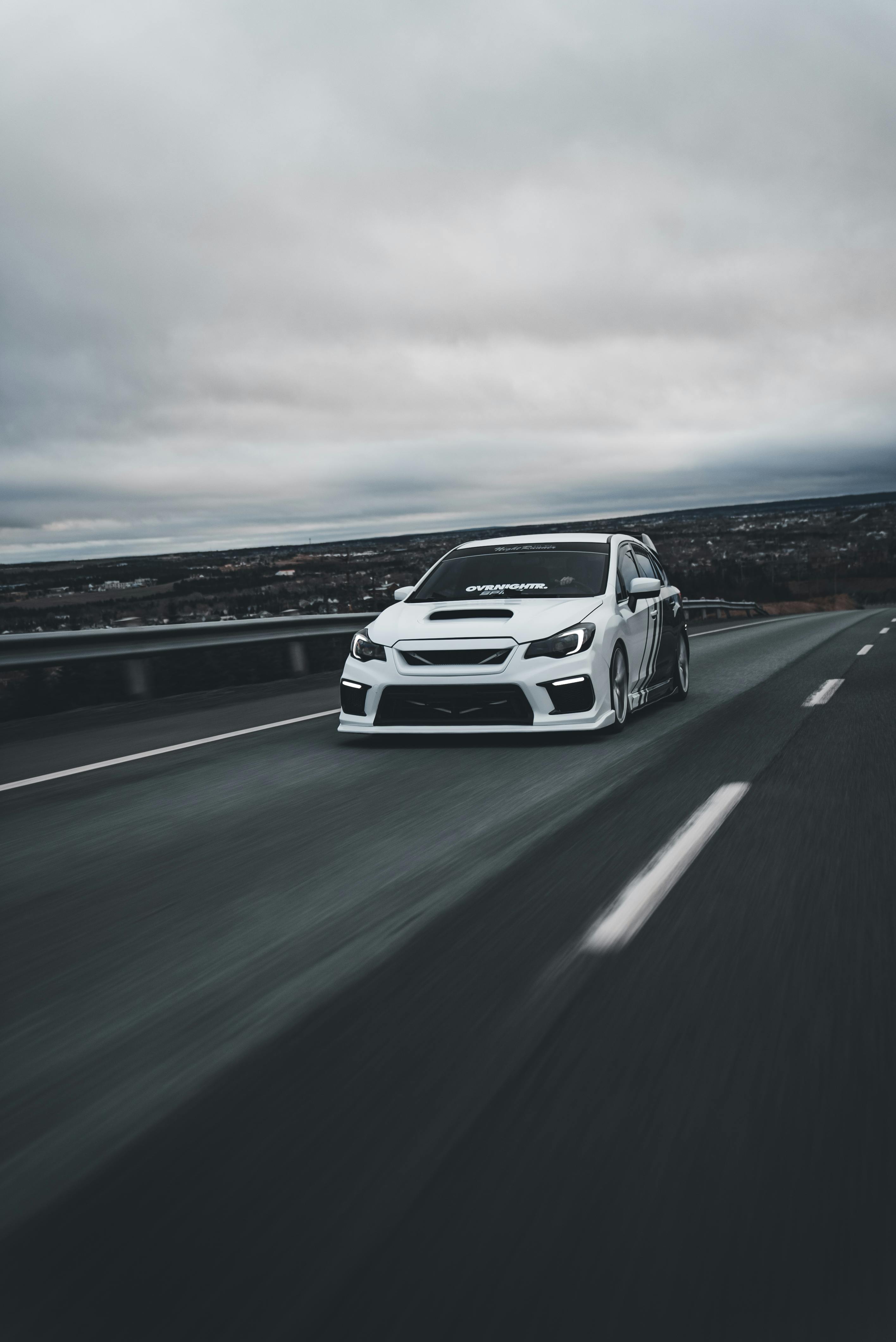 White Car On The Road · Free Stock Photo