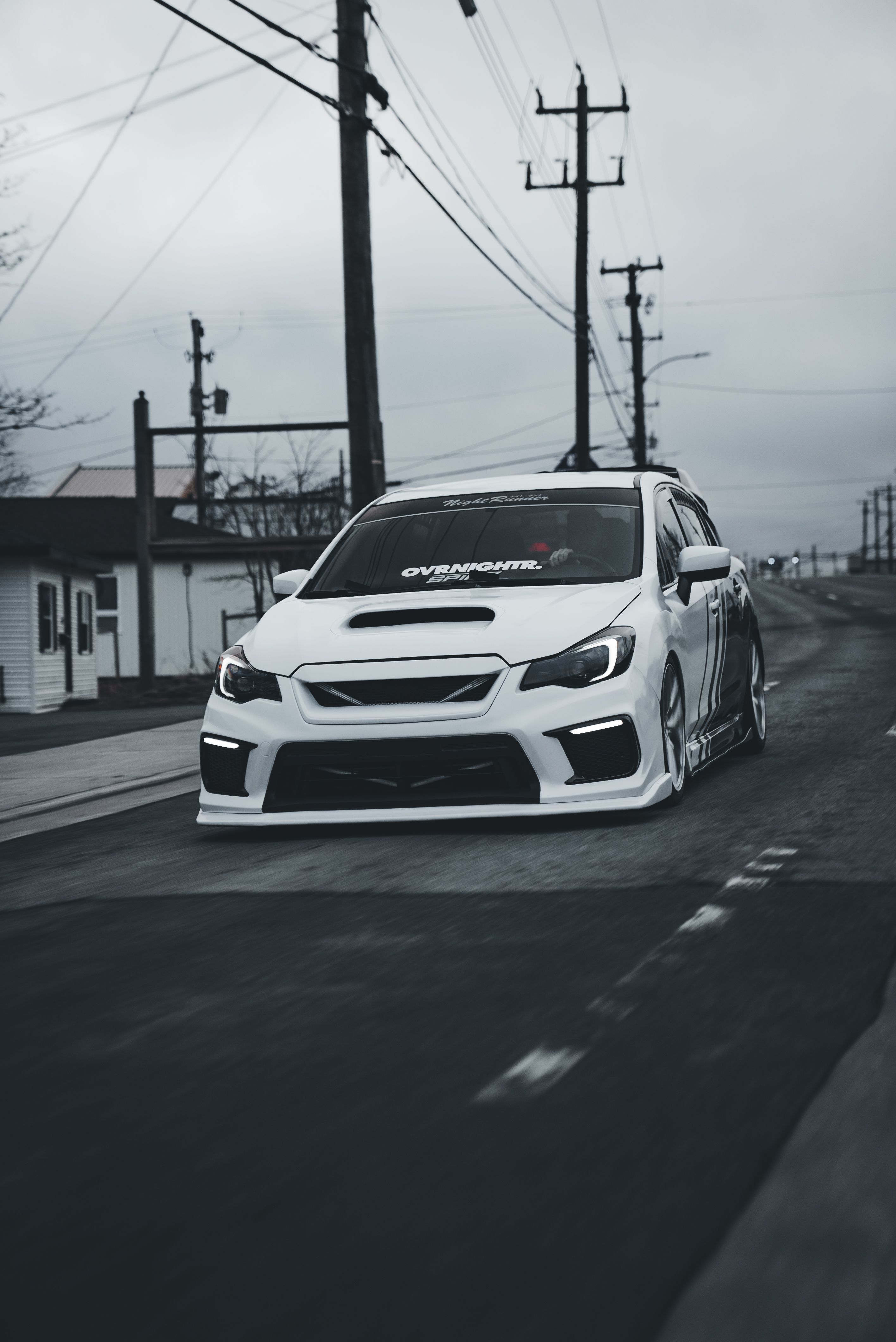 White Subaru WRX on Road in Village · Free Stock Photo